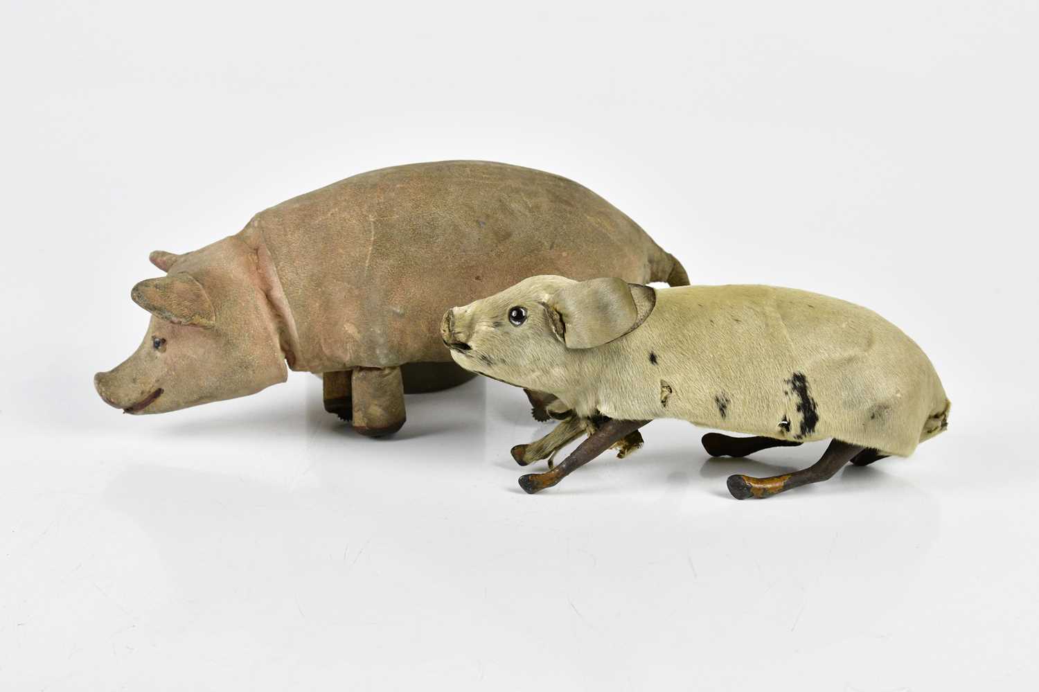 Lot 4377 - A vintage clockwork leather automation pig,