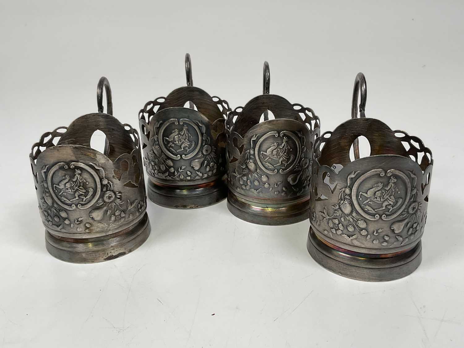 Lot 569 - A set of four Scandinavian white metal cup