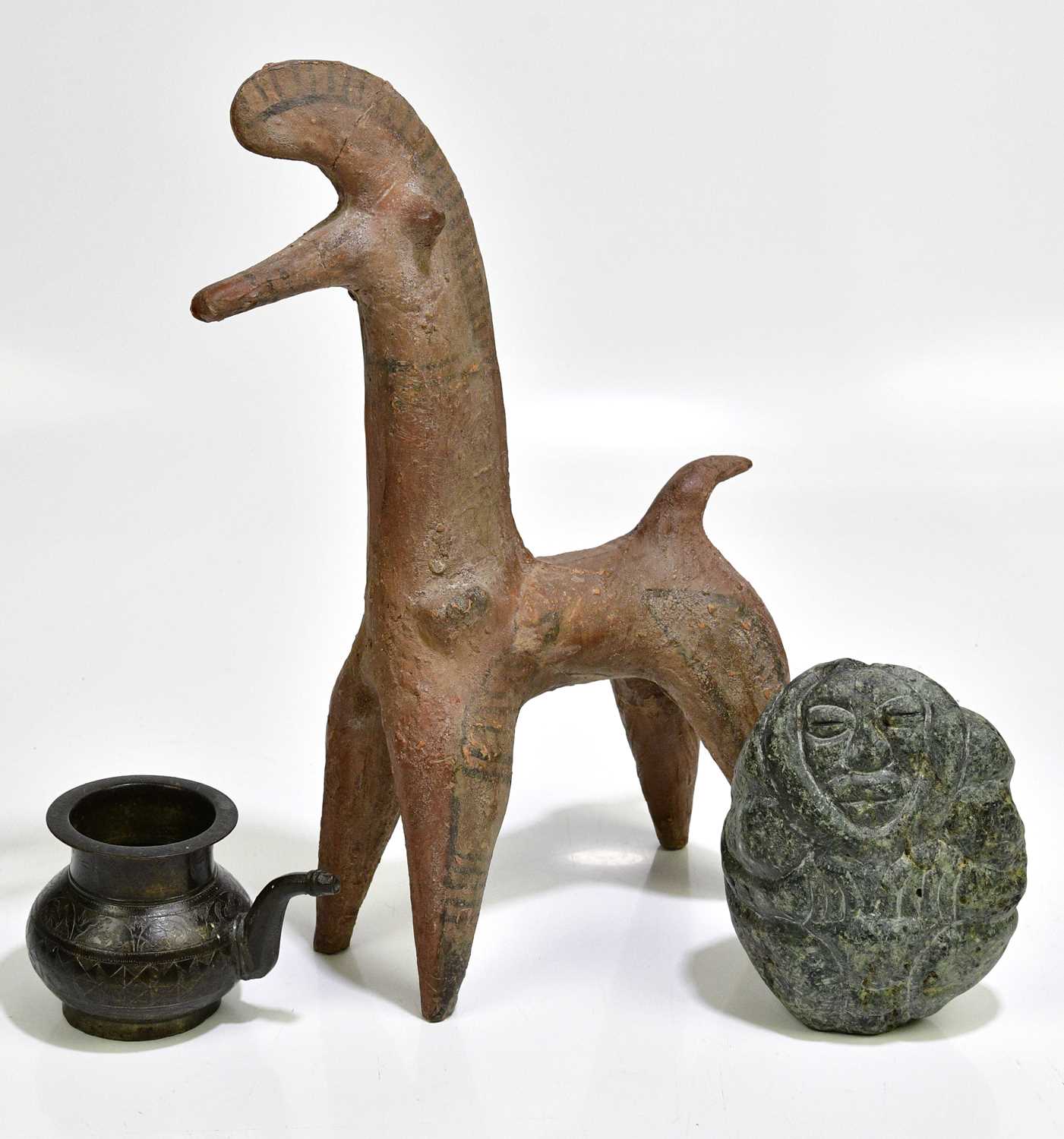 Lot 1579 - An unusual painted terracotta model of a