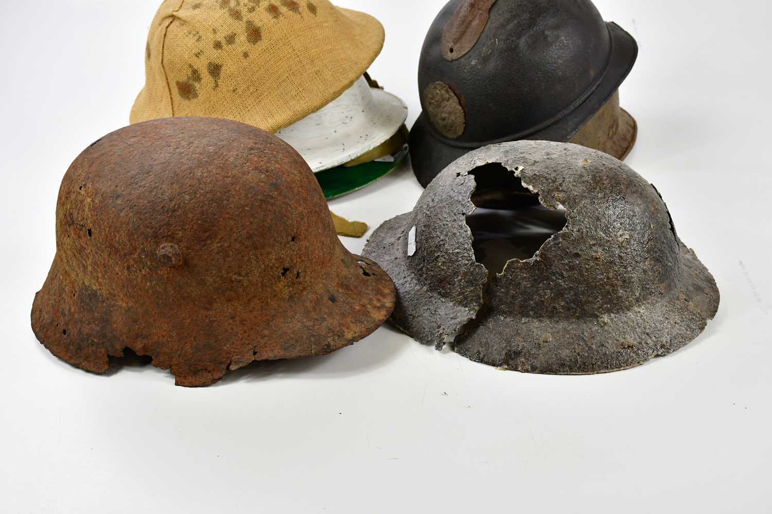 Lot 451 - Seven various military helmets including a