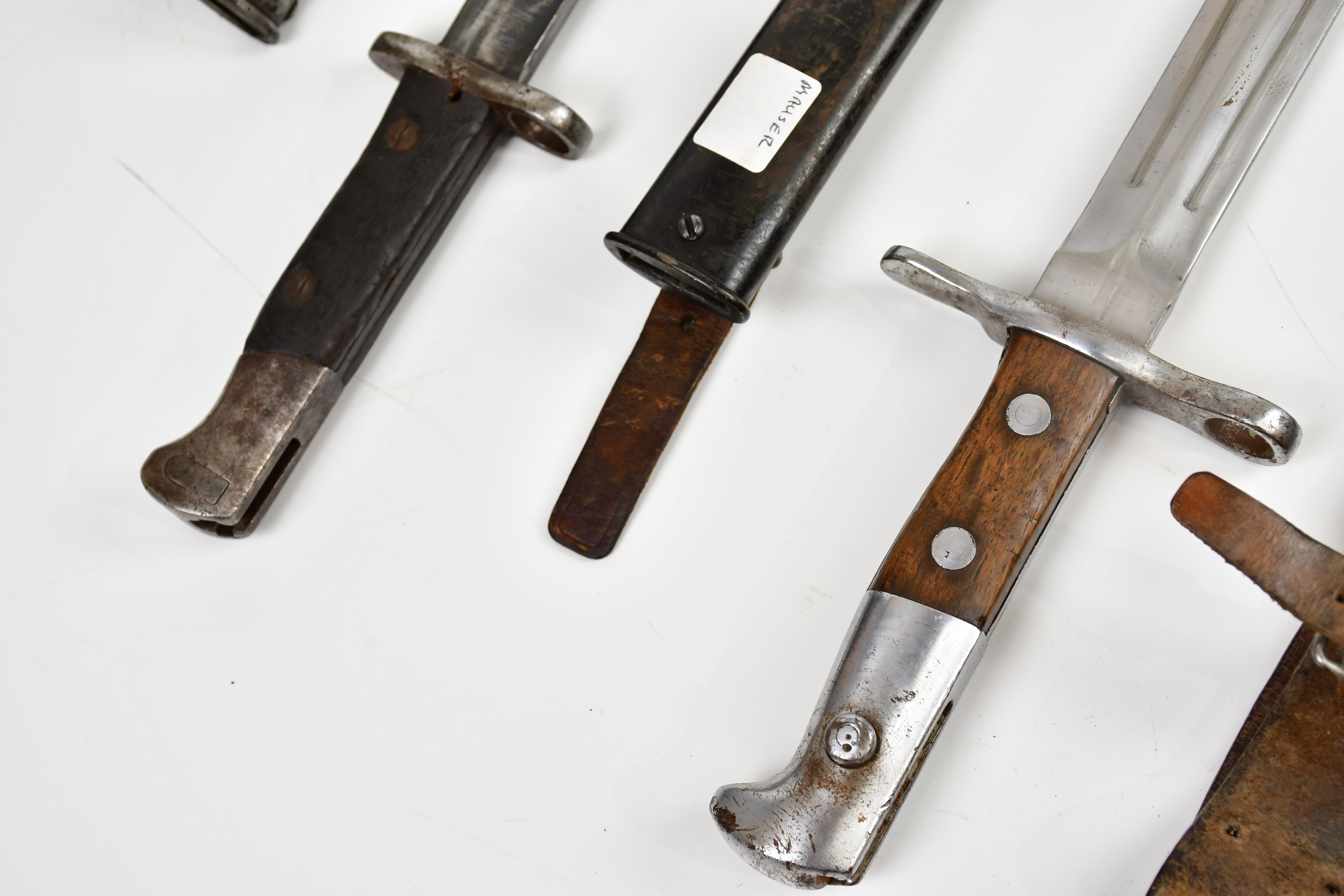 Lot 703 - Three Mauser bayonets, including a Swedish