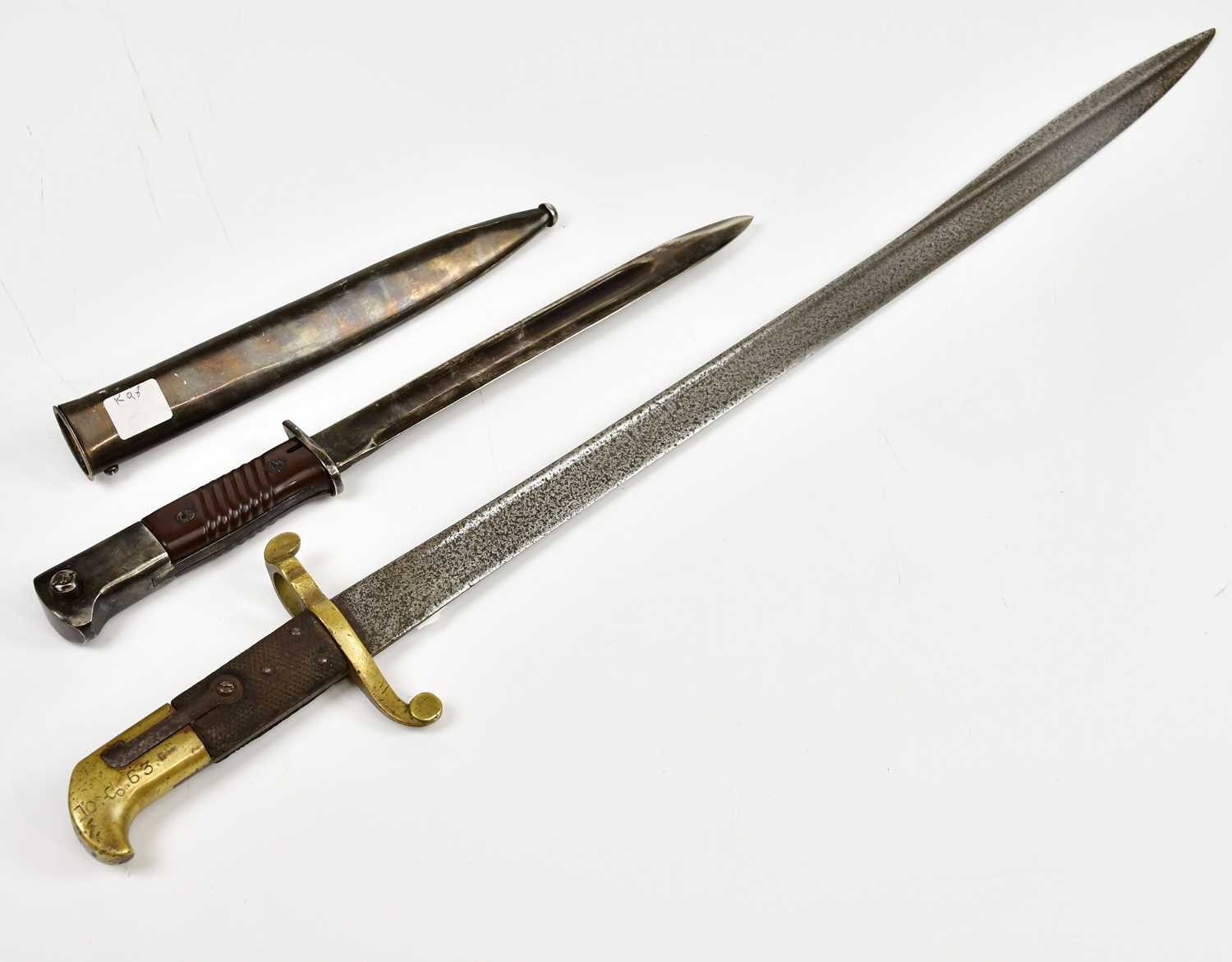 Lot 720 - A 19th century British bayonet with brass