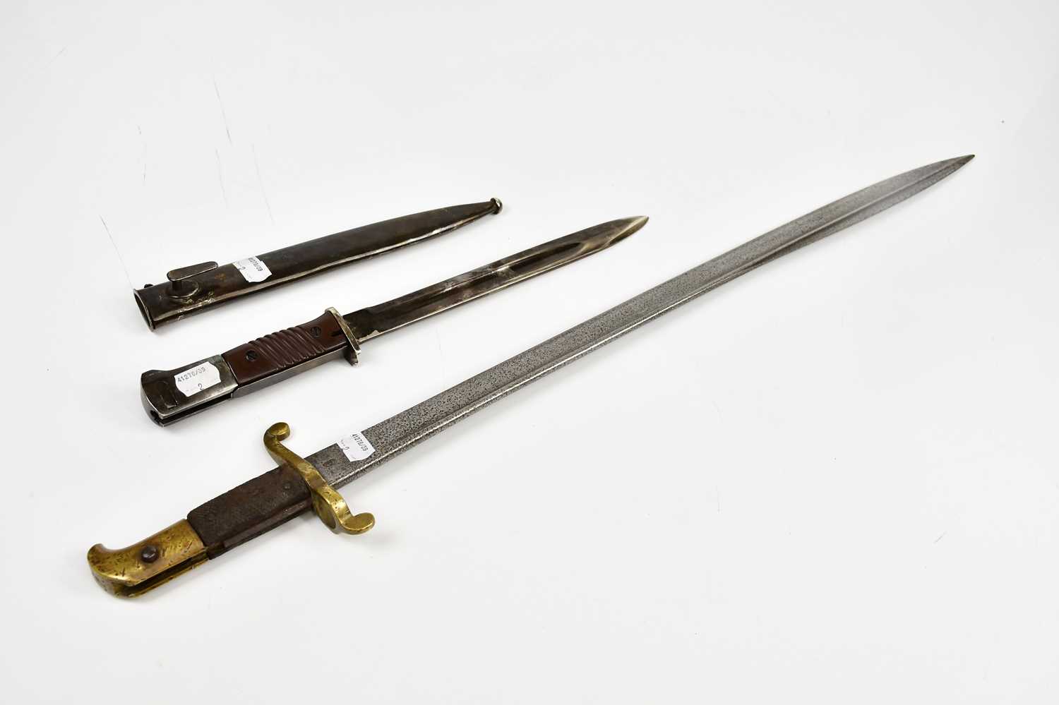 Lot 720 - A 19th century British bayonet with brass