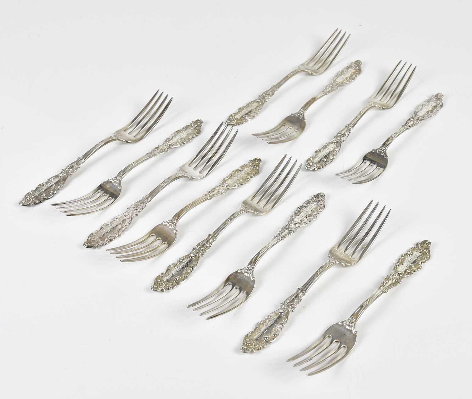 Lot 2380 - A set of twelve forks, stamped sterling