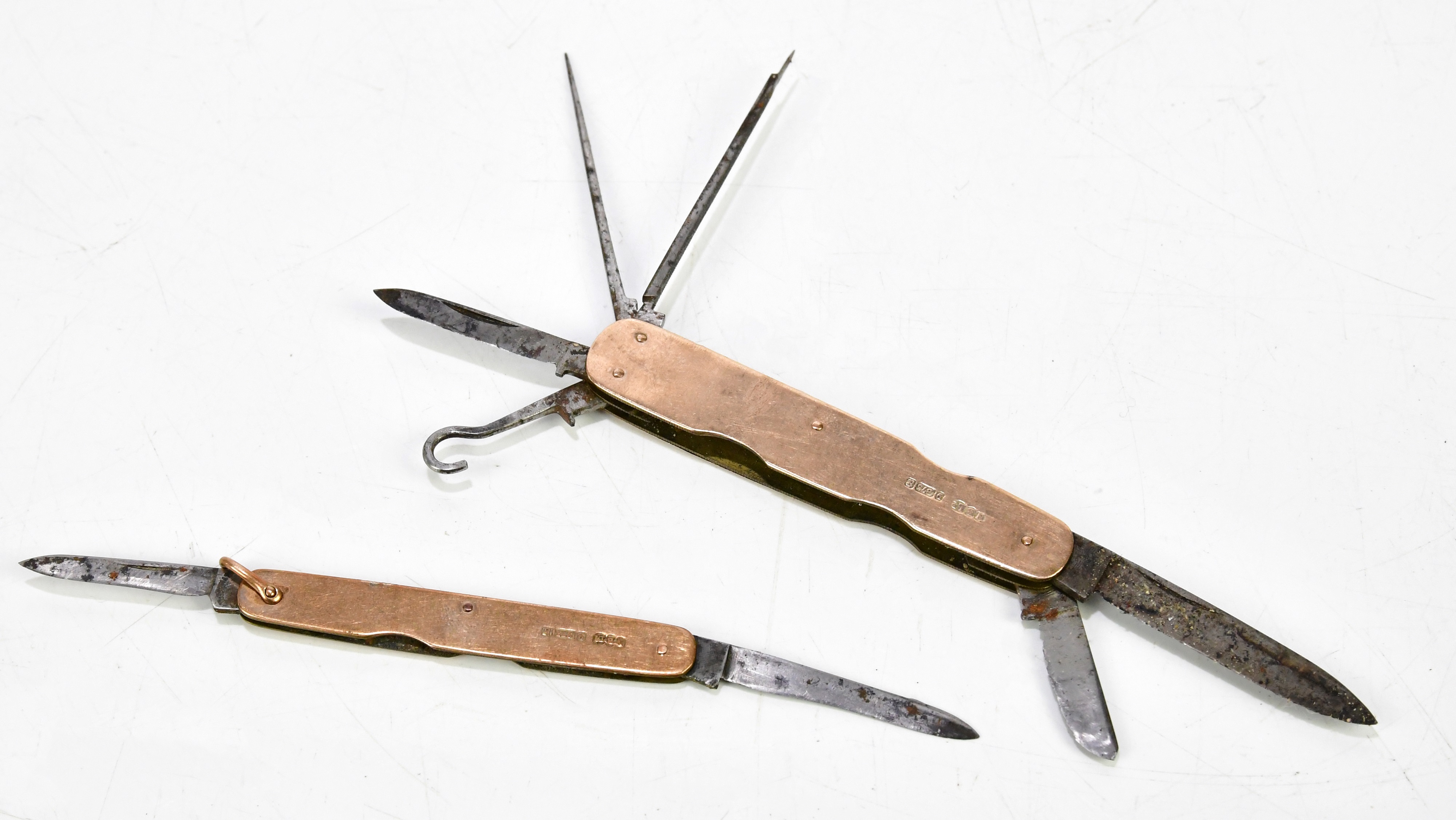 Lot 21 - Two 9ct yellow gold faced pocket knives, one