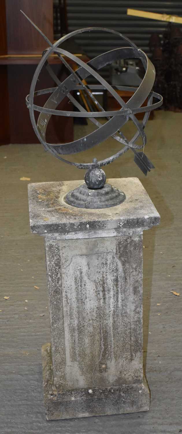 Lot 176 - A bronze armillary sphere on stone base,