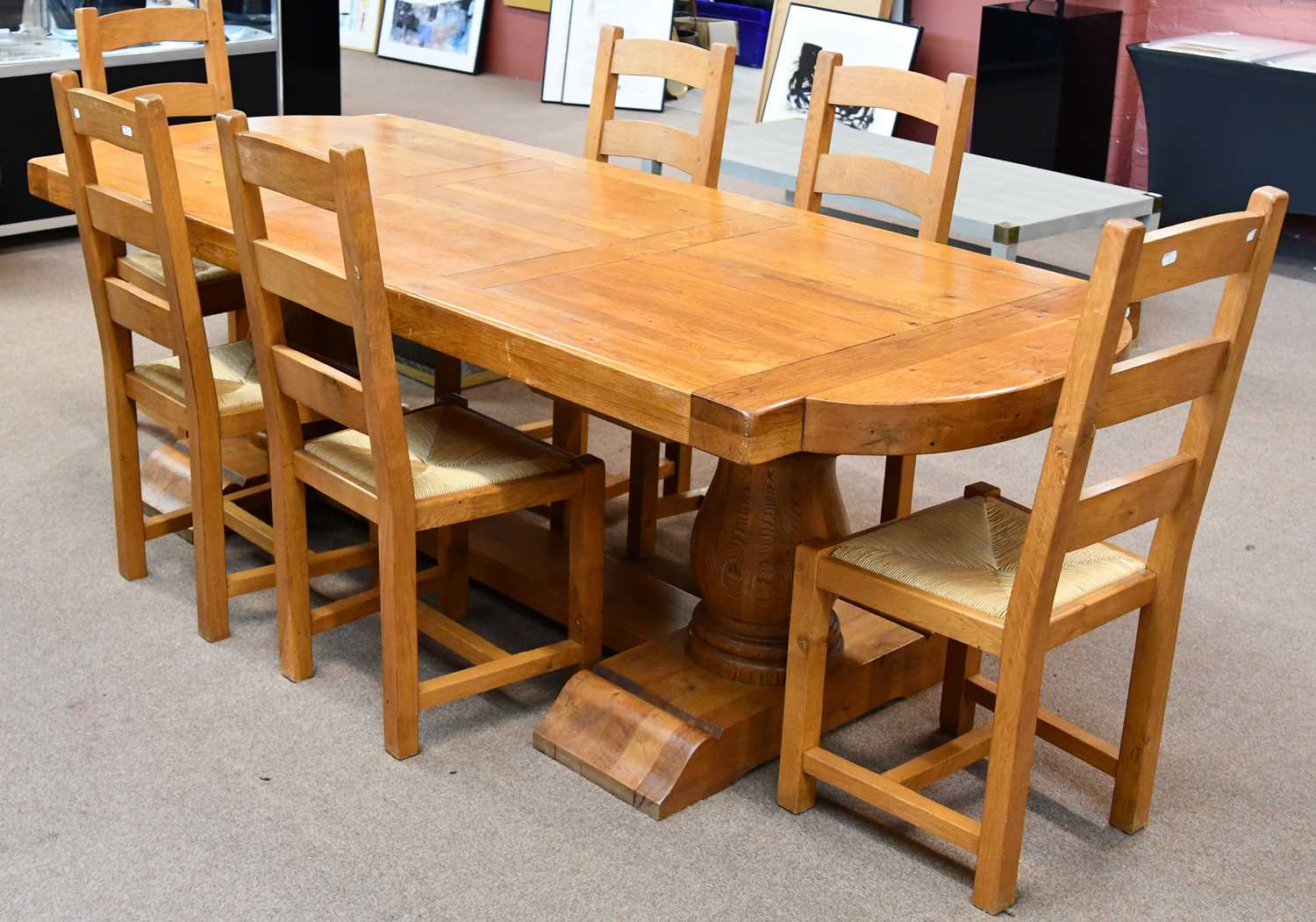 Lot 2361 - A modern solid oak refectory dining table