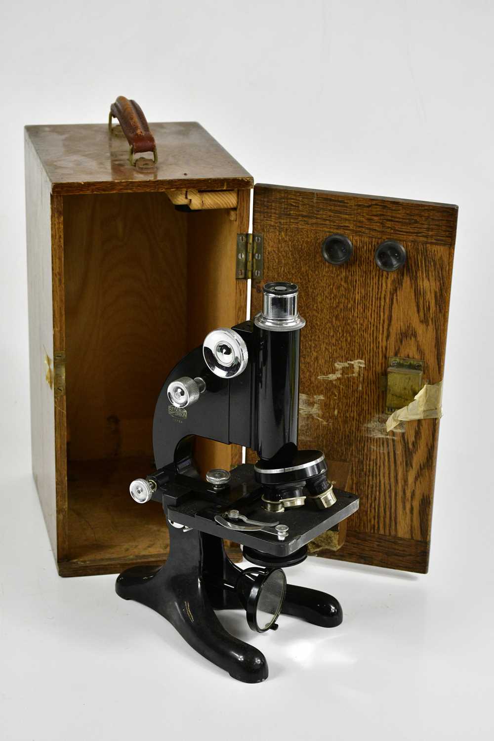 Lot 1563 - BECK, LONDON; a lacquered microscope in oak