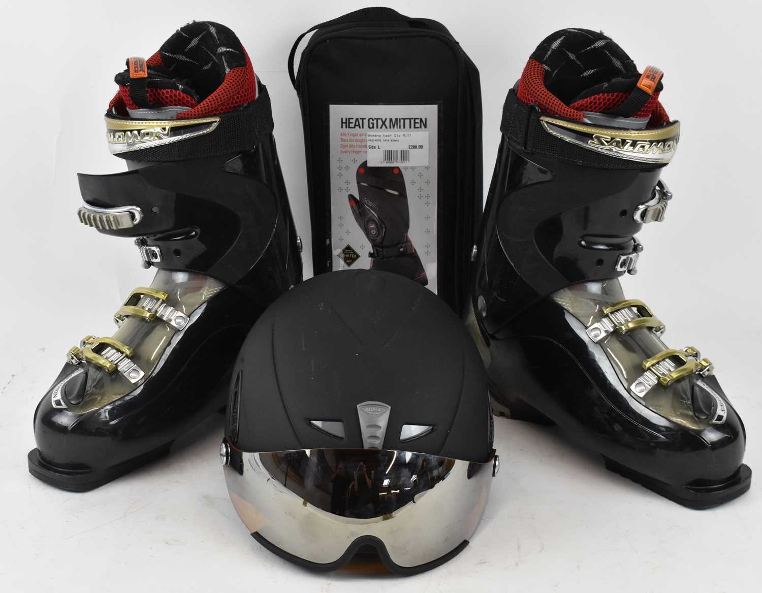 Lot 483 - A pair of Salomon ski boots, size 28, a Uvex