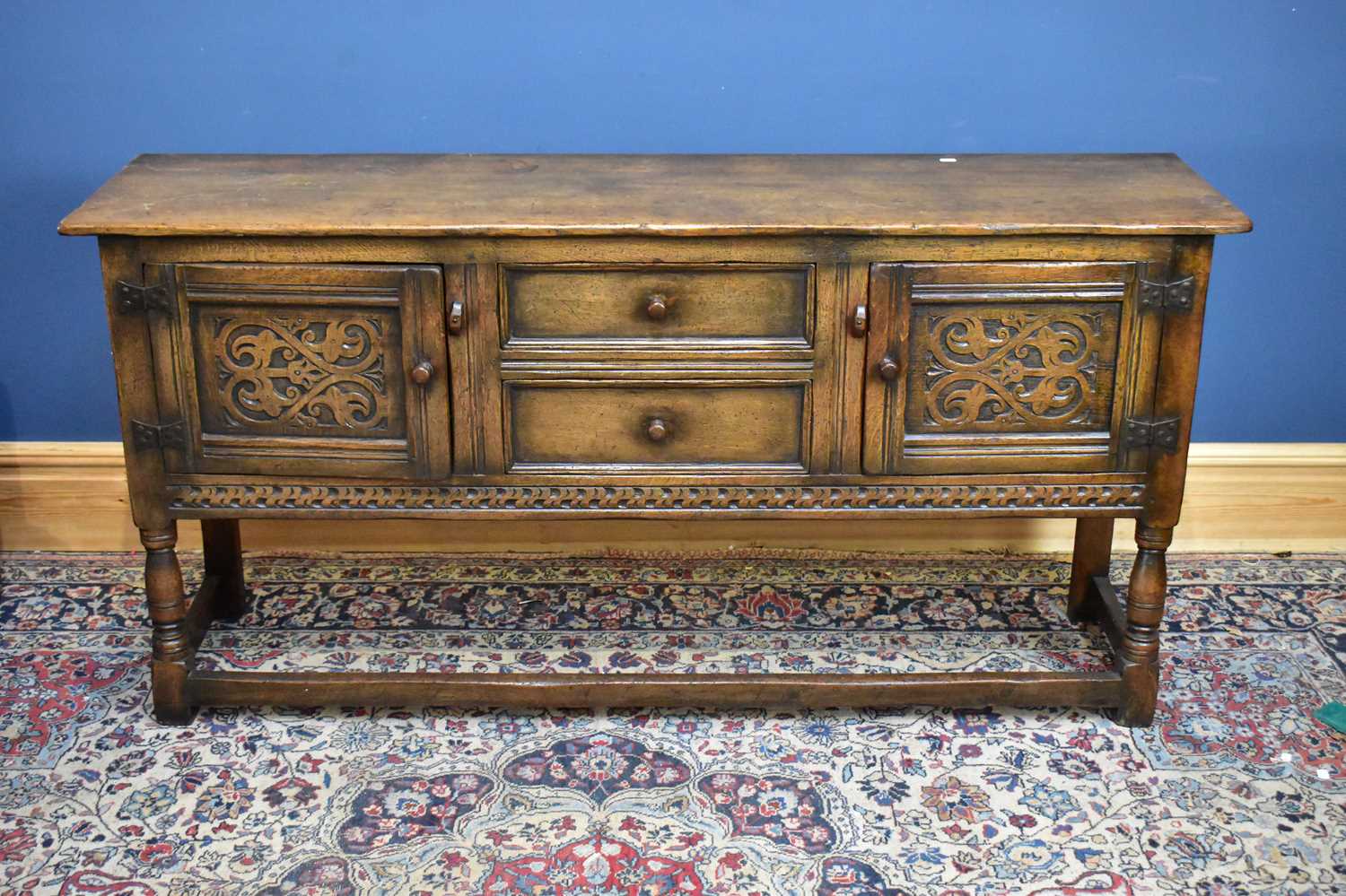 Lot 2634 - A reproduction oak sideboard with two