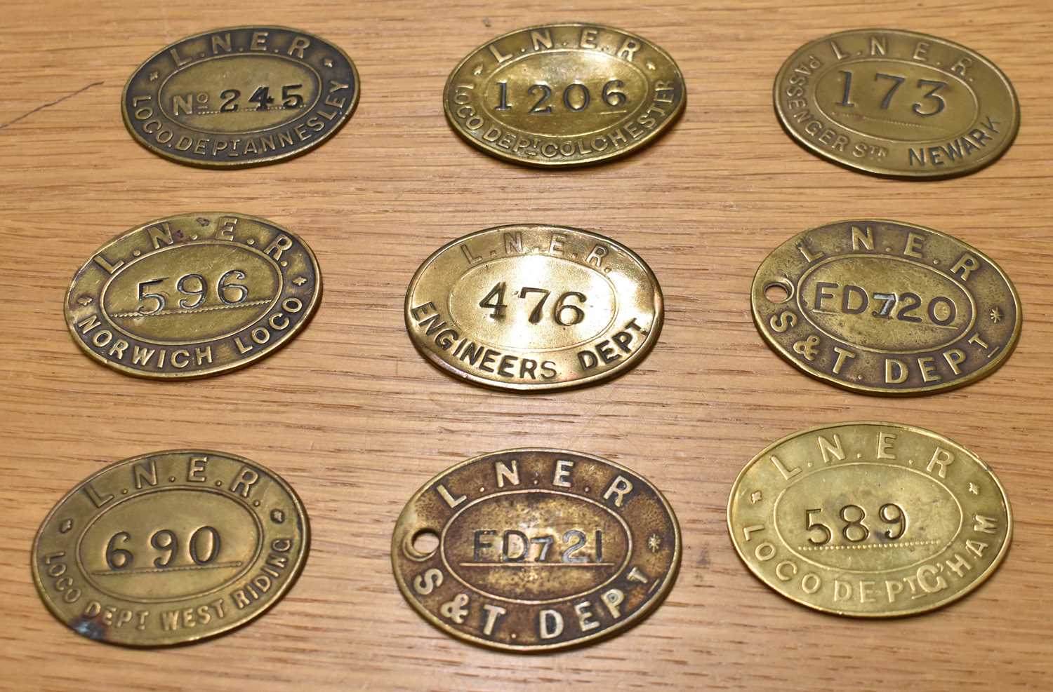 Lot 231 - LNER; nine assorted oval brass
