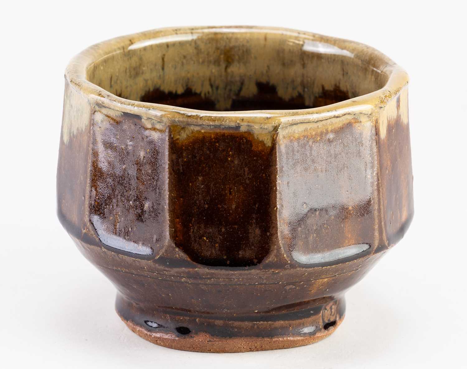 Lot 384 - MIKE DODD (born 1943); a faceted stoneware