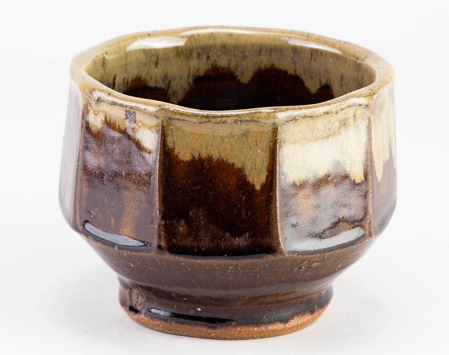 Lot 384 - MIKE DODD (born 1943); a faceted stoneware