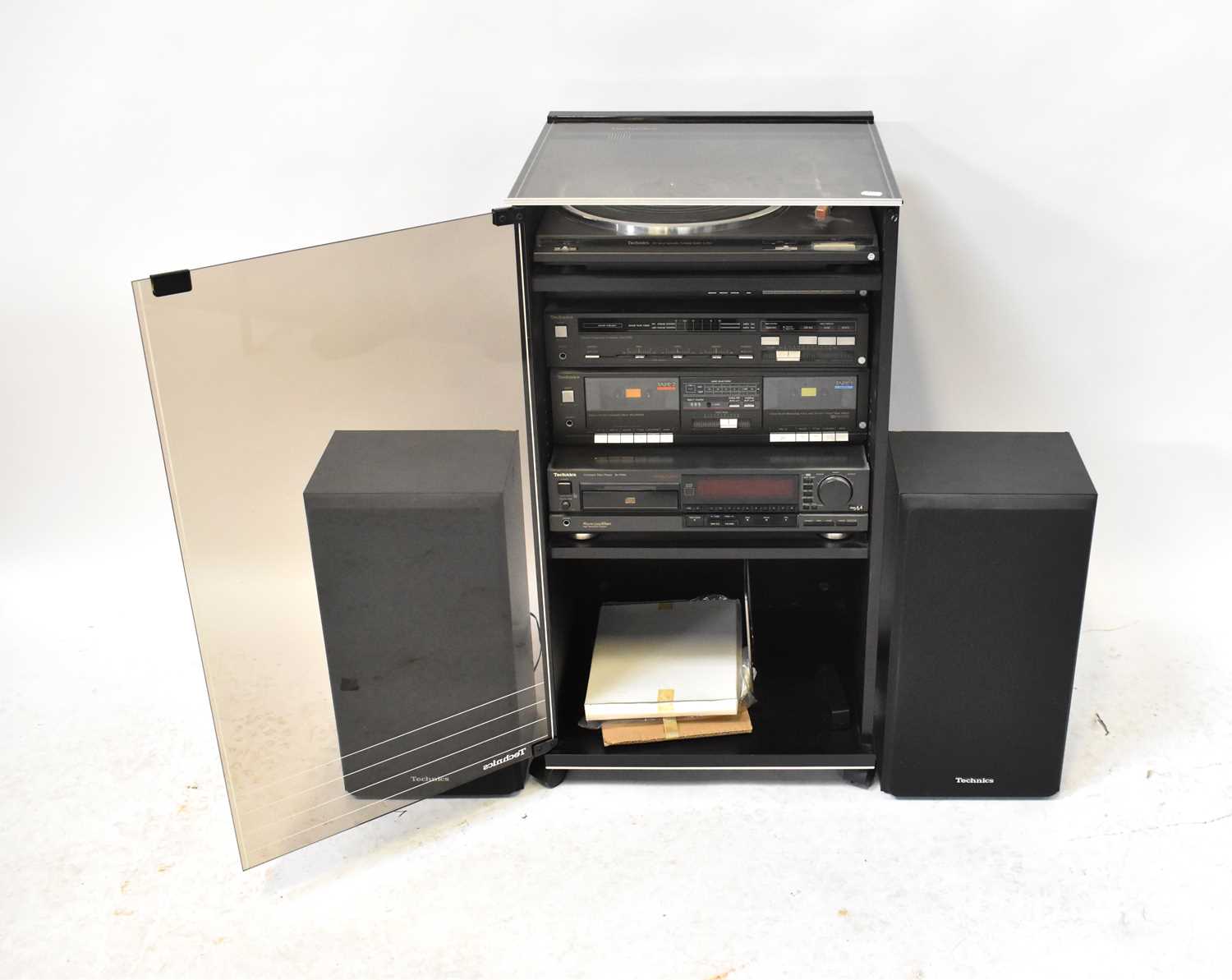 Lot 692 - TECHNICS; a cased hi-fi unit comprising a