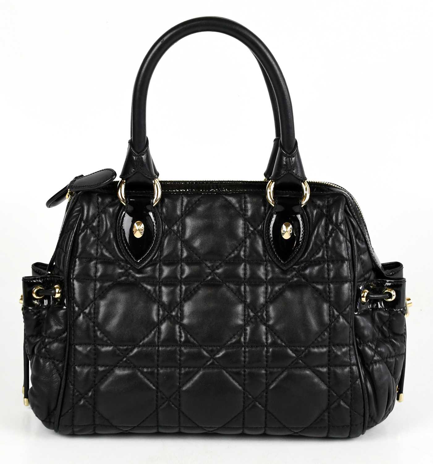Lot 684 - CHRISTIAN DIOR; a black cannage quilted