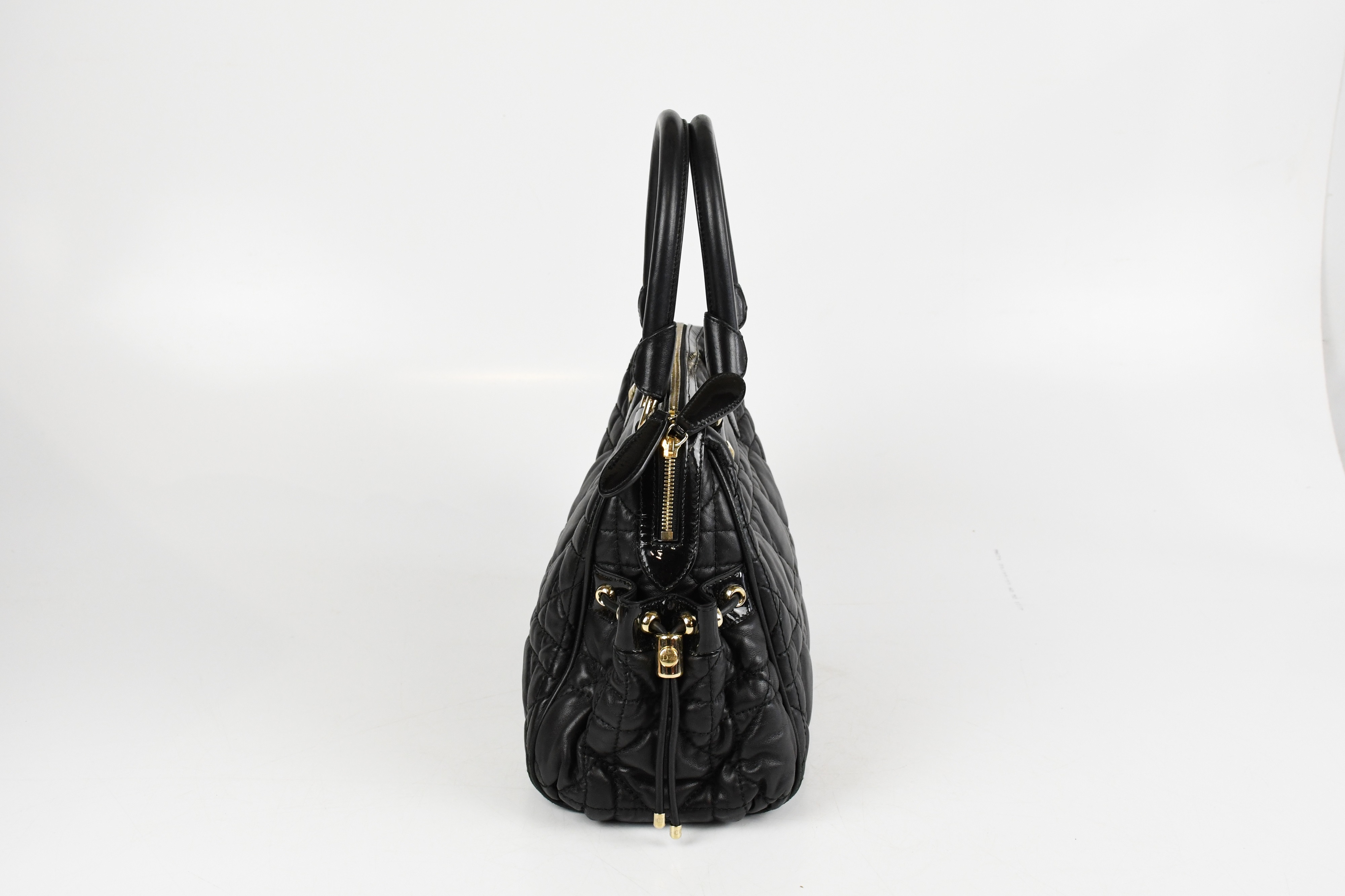 Lot 684 - CHRISTIAN DIOR; a black cannage quilted