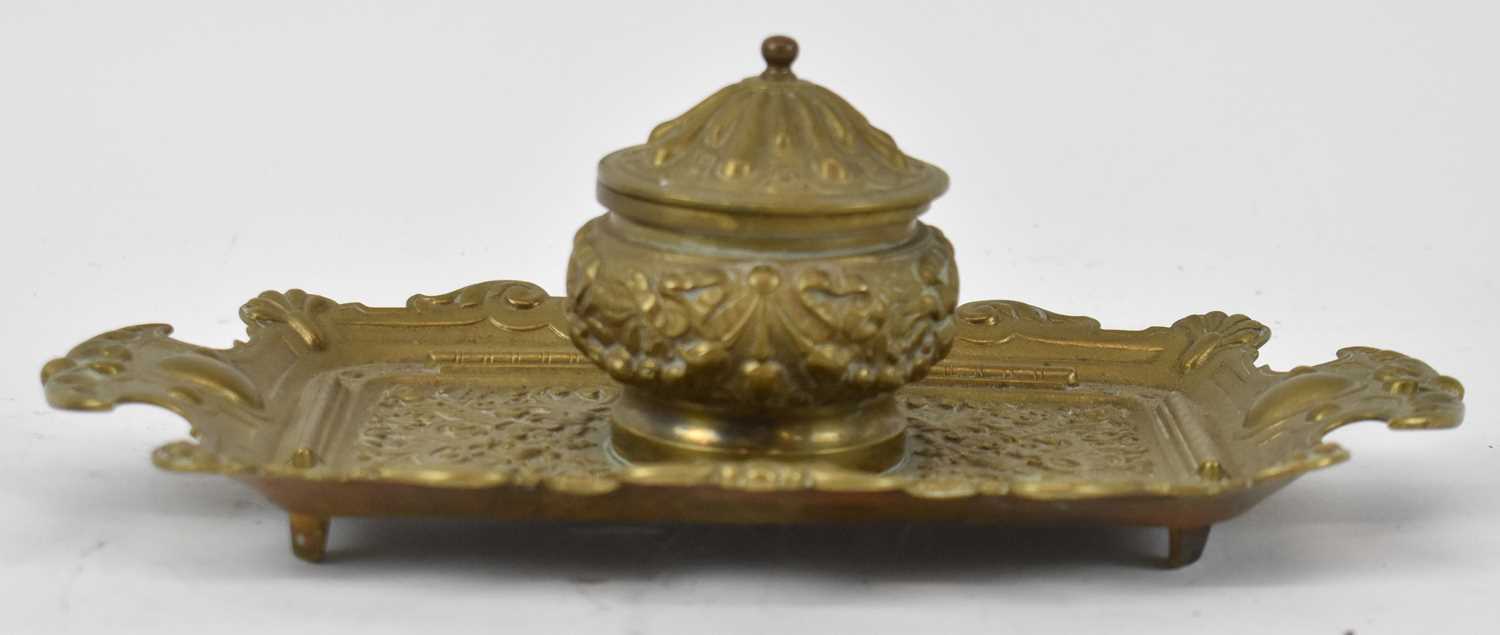 Lot 470 - An ornate brass inkstand, width 24cm.