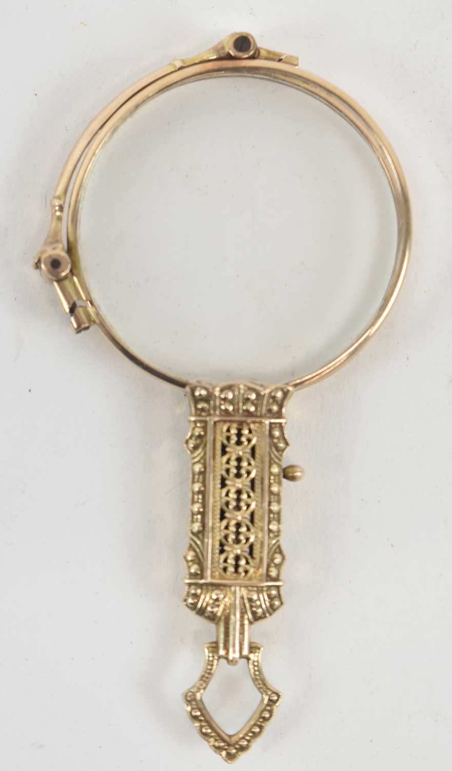 Lot 786 - A pair of 9ct gold folding spectacles.