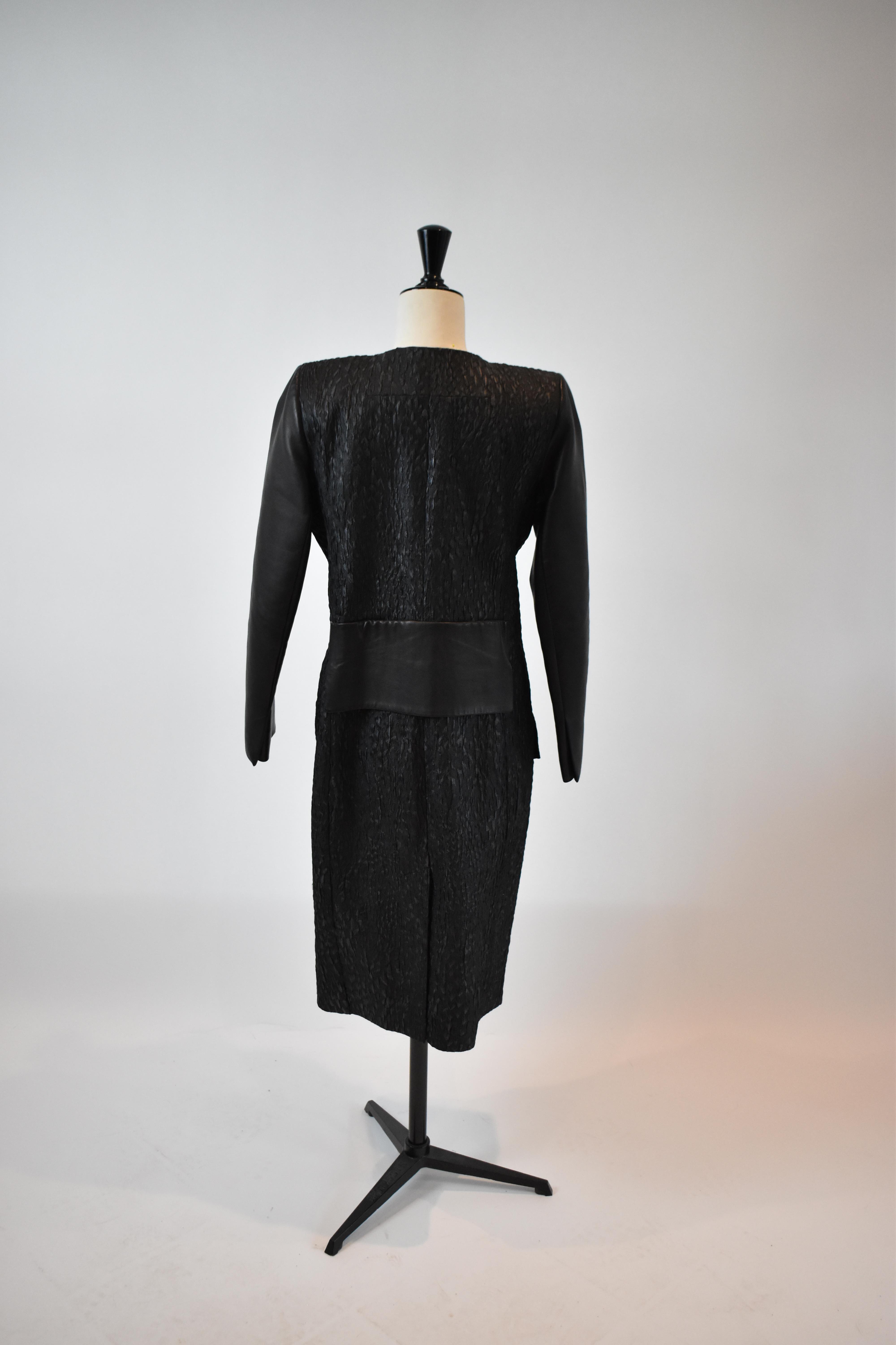 Lot 33 - ROLAND MOURET; a black leather and fabric