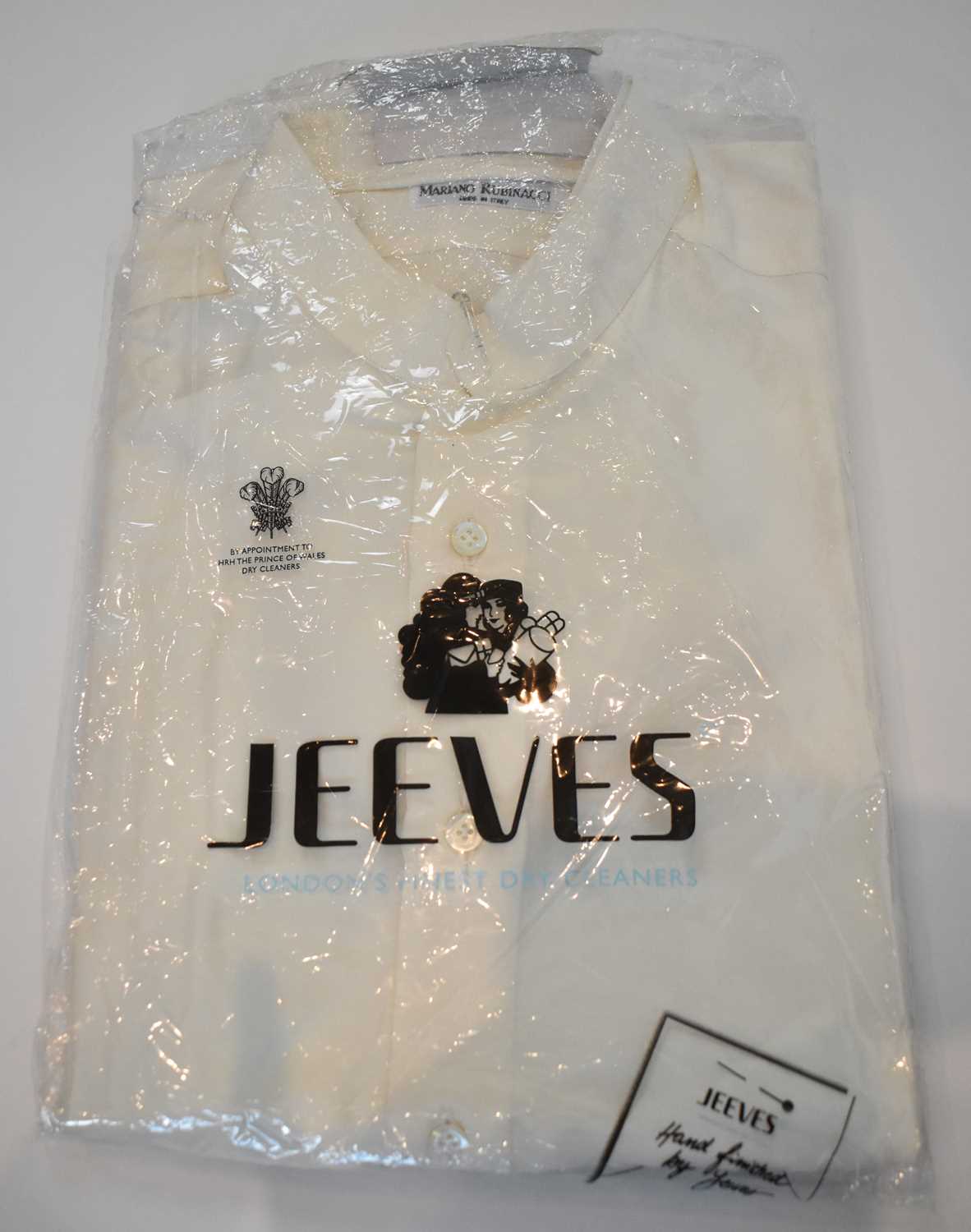 Lot 298 - MARIANO RUBINACCI; a cream cotton long