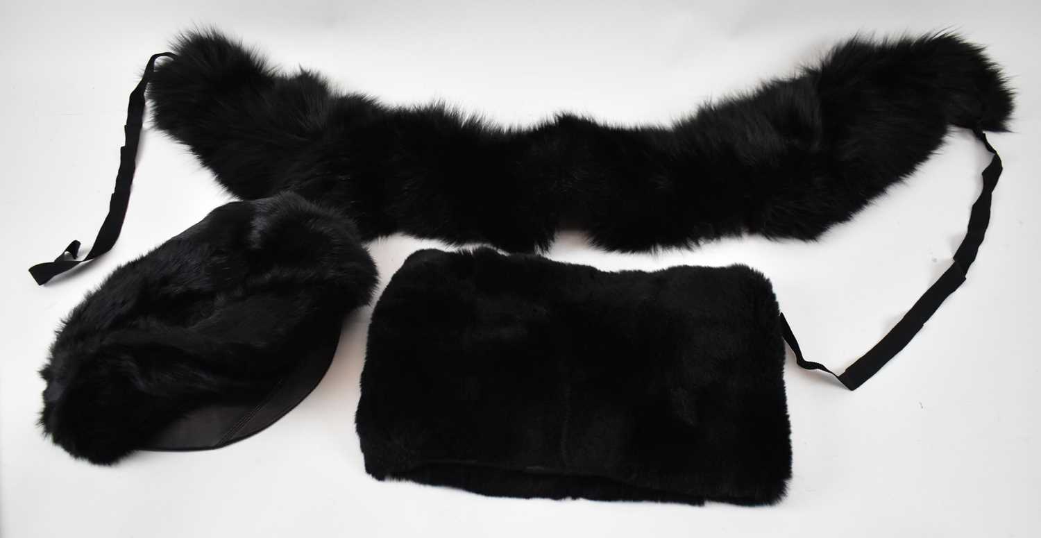 Lot 506 - STEPHEN JONES; a black fur peaked cap, a