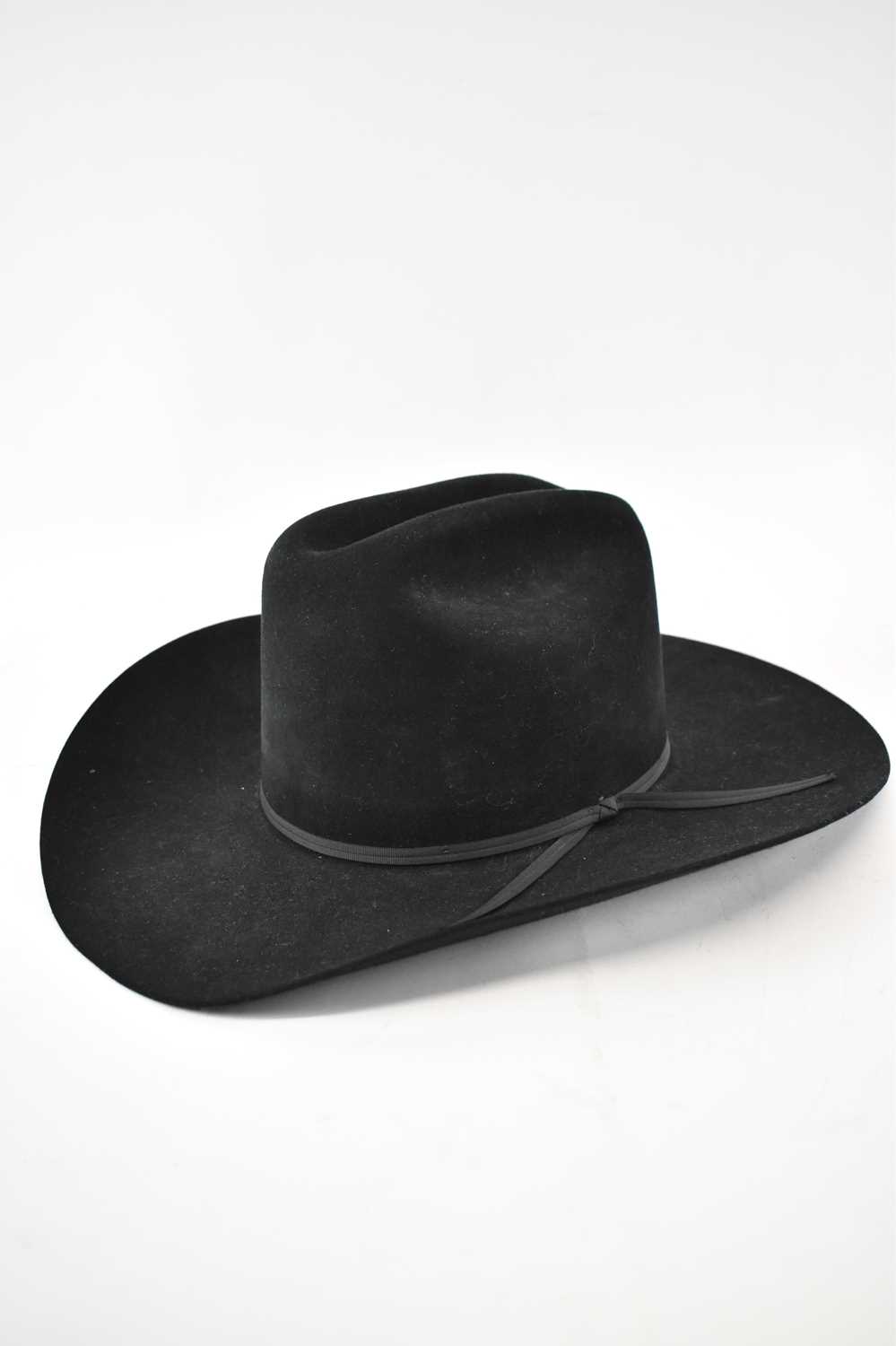 Lot 515 - JOHN B STETSON COMPANY; a black suede