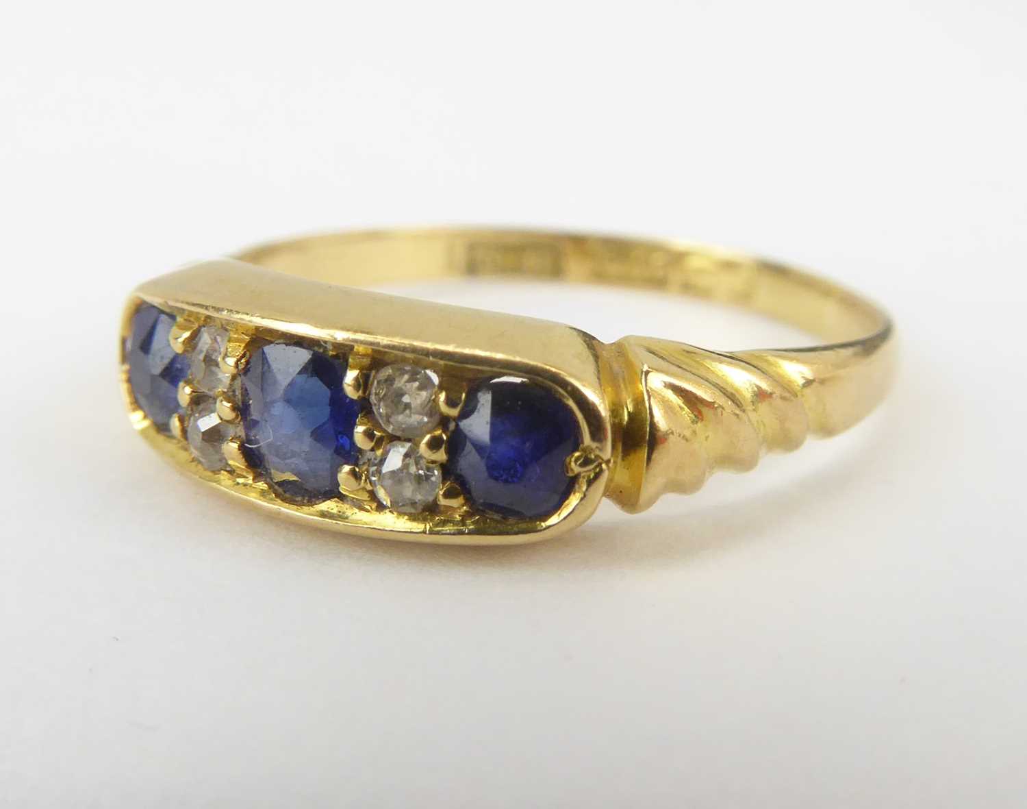 Lot 1018 - Two 18ct gold dress rings