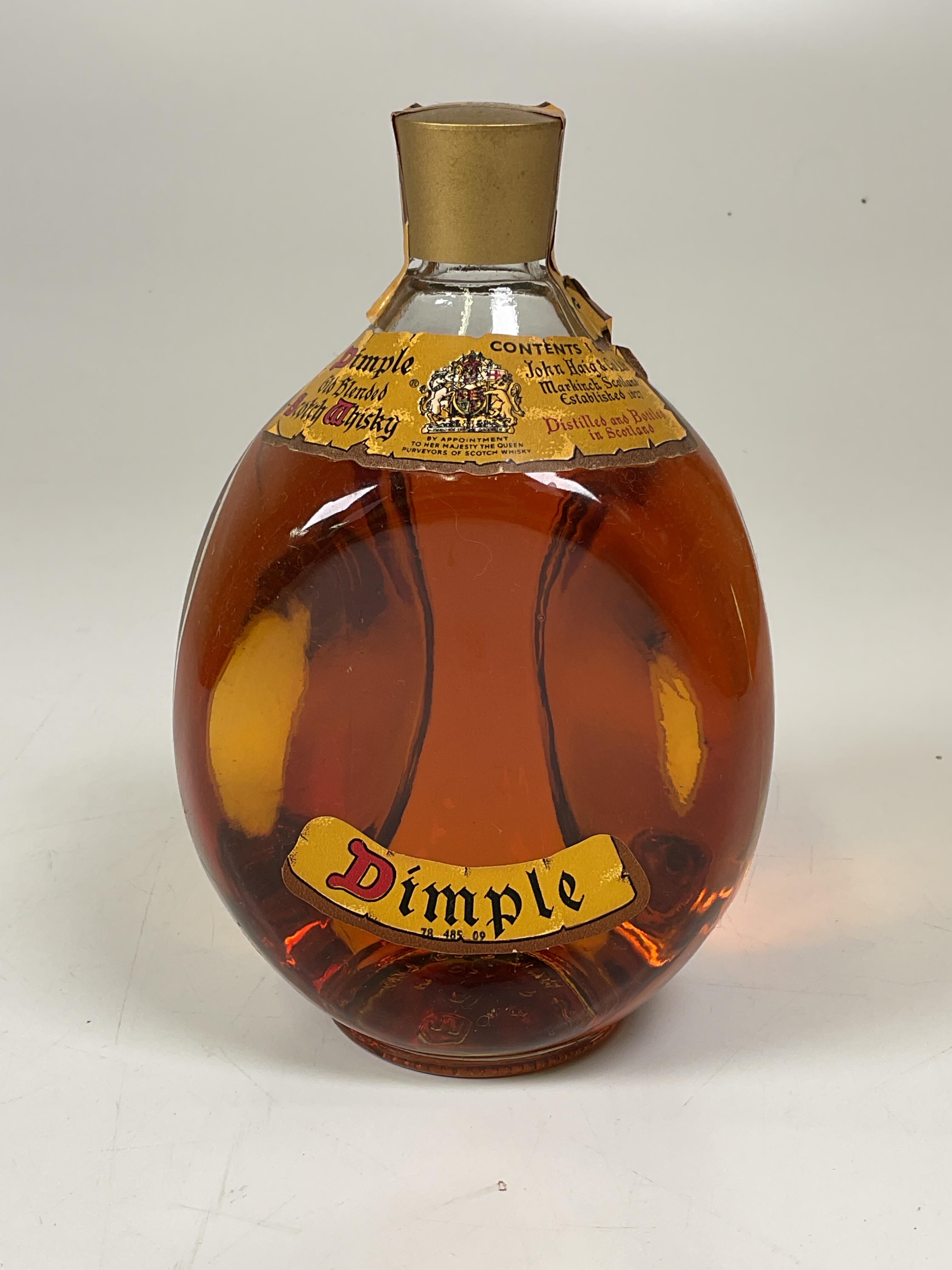 Lot 279 - A litre bottle of Dimple Old Blended Scotch