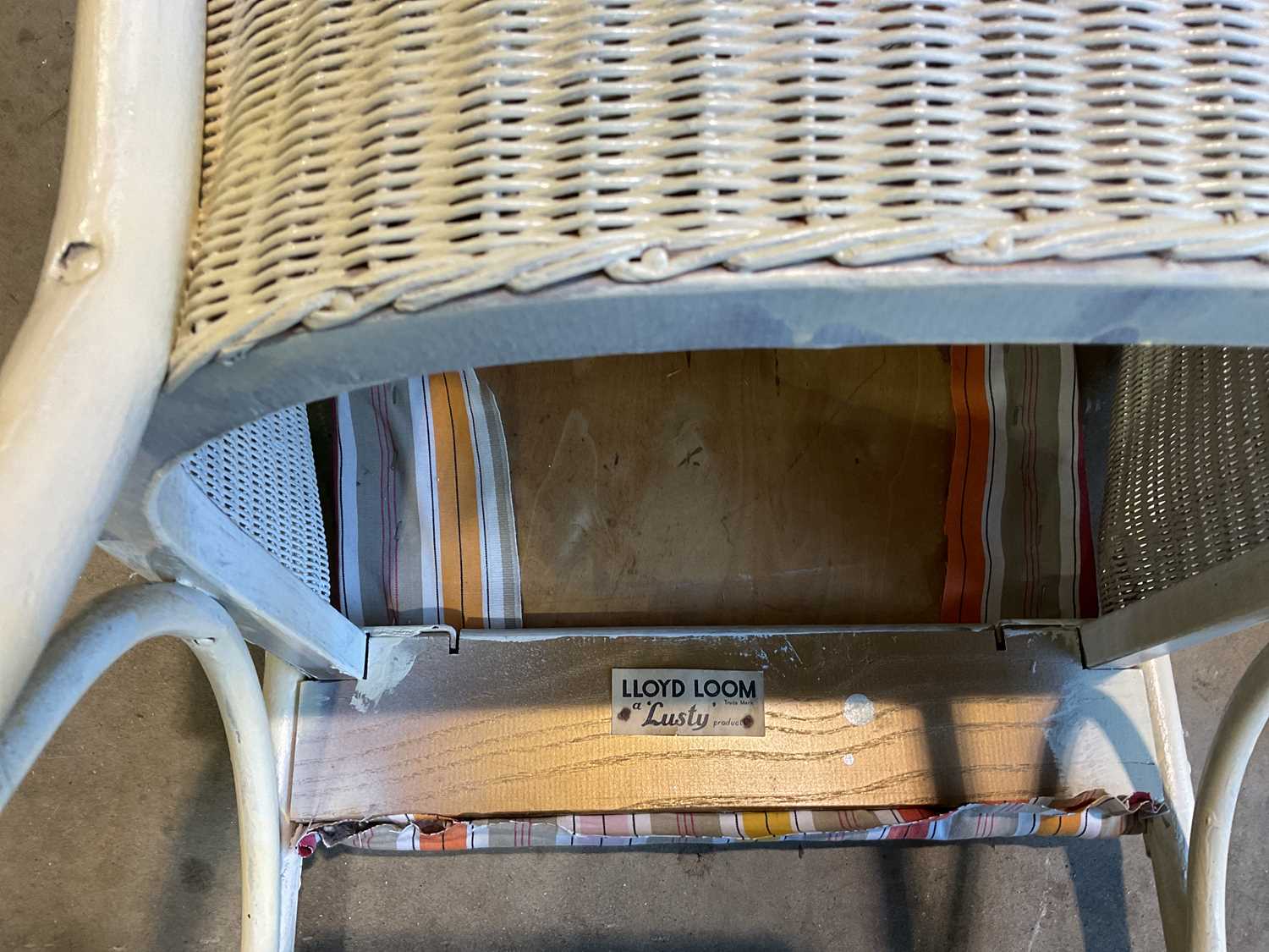 Lot 785 - A Lloyd Loom chair, original label to base,