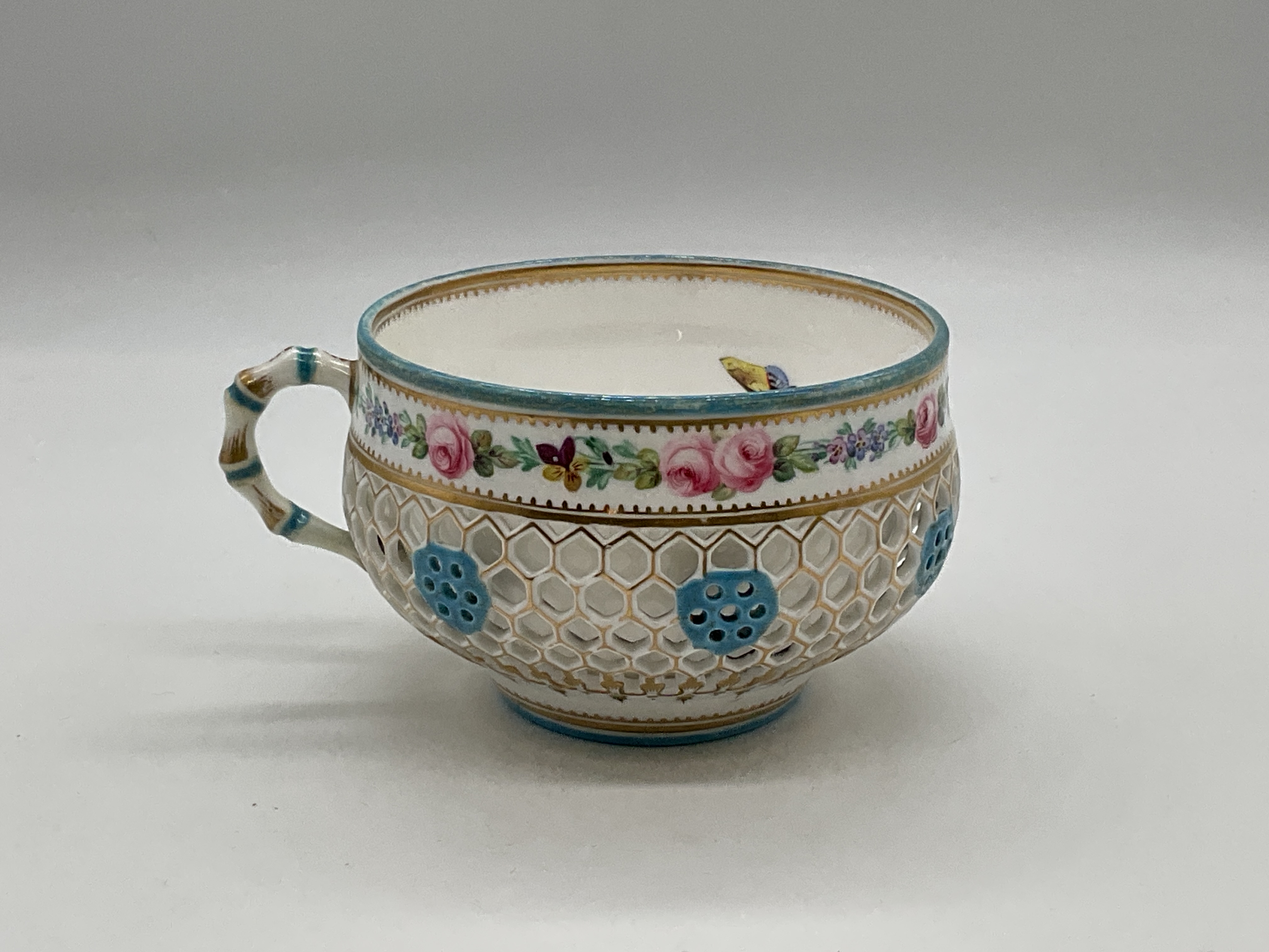 Lot 410 - WORCESTER; a double walled reticulated