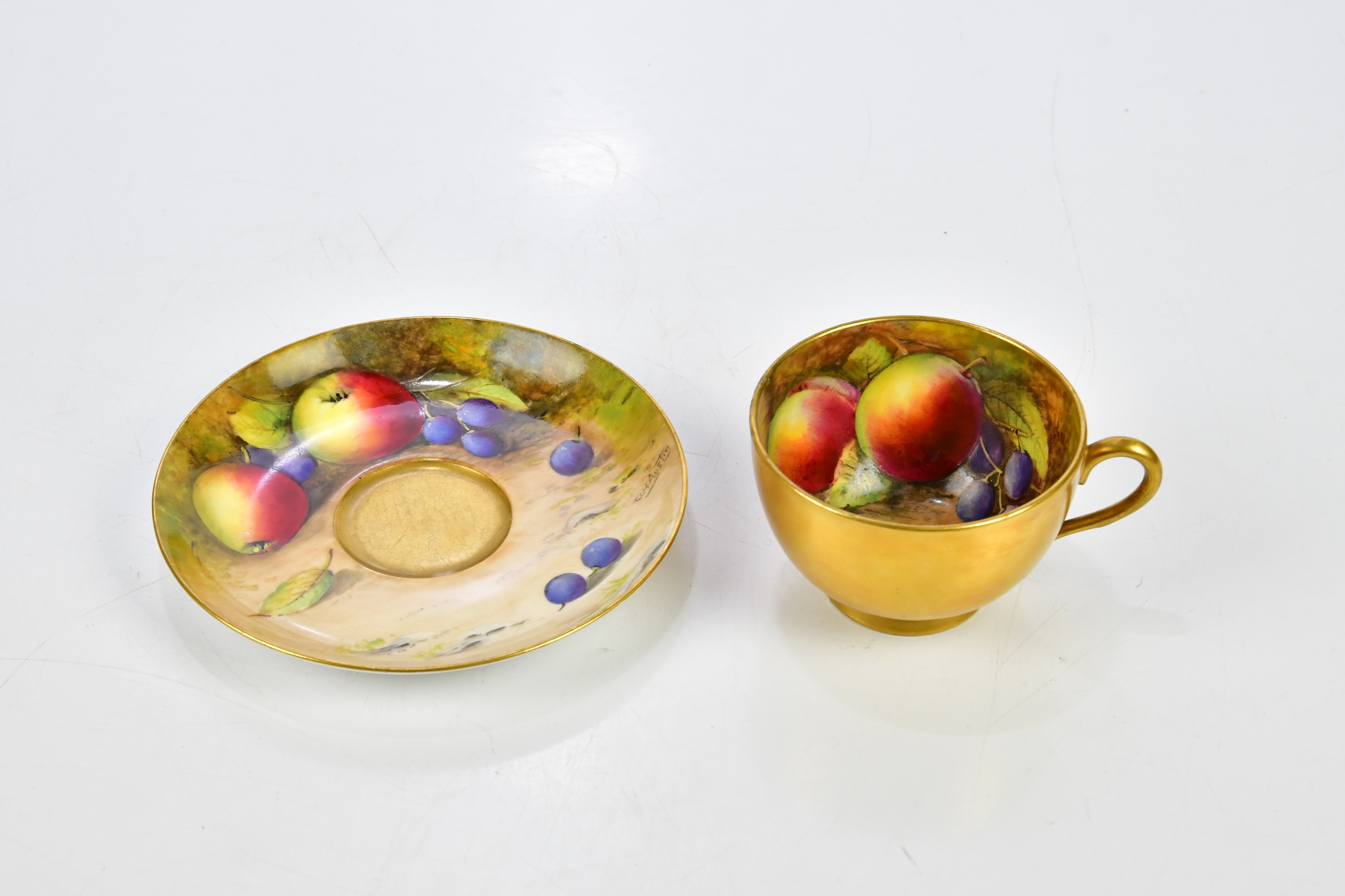Lot 2035 - W. H. AUSTIN FOR ROYAL WORCESTER; a hand