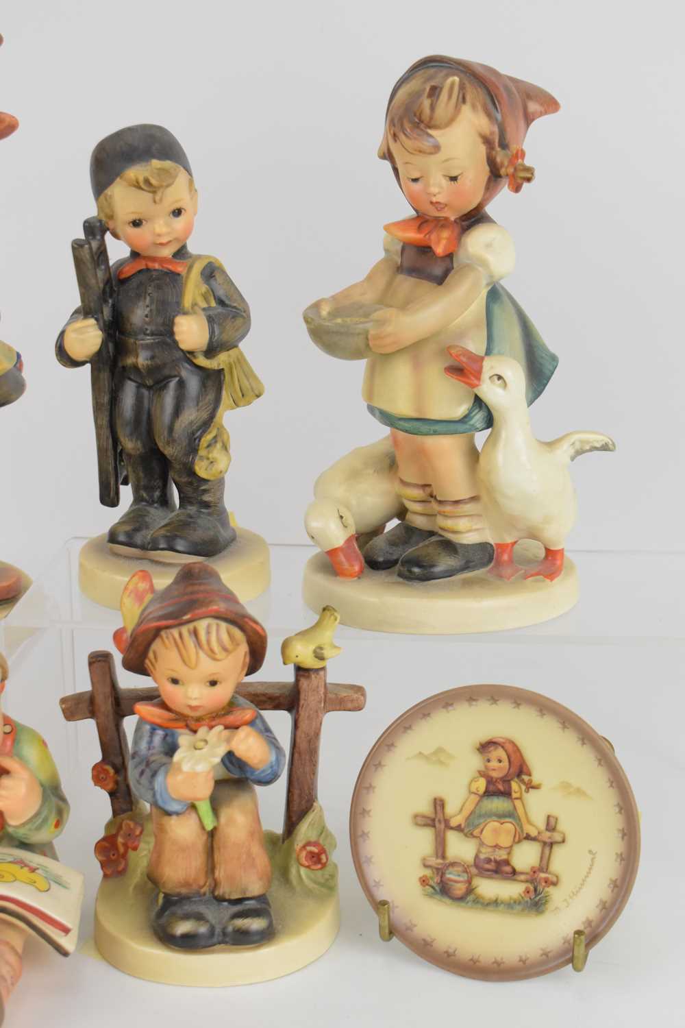 Lot 393 - HUMMEL/GOEBEL; six collectible figures,