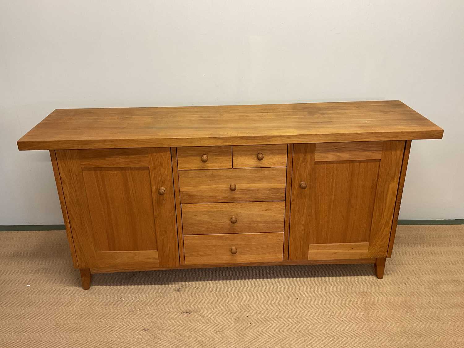 Lot 704 - A blonde oak sideboard, height 78cm, width