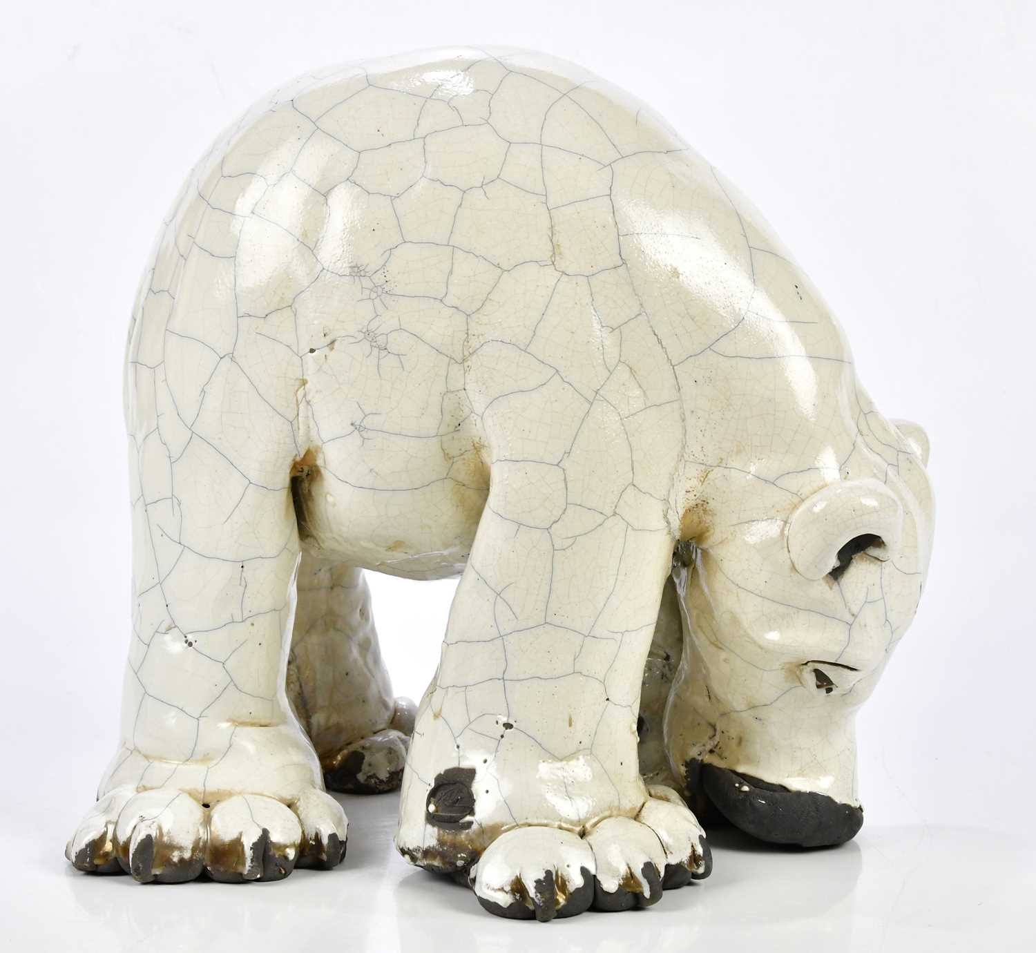 Lot 172 - A raku model of a polar bear with crackle