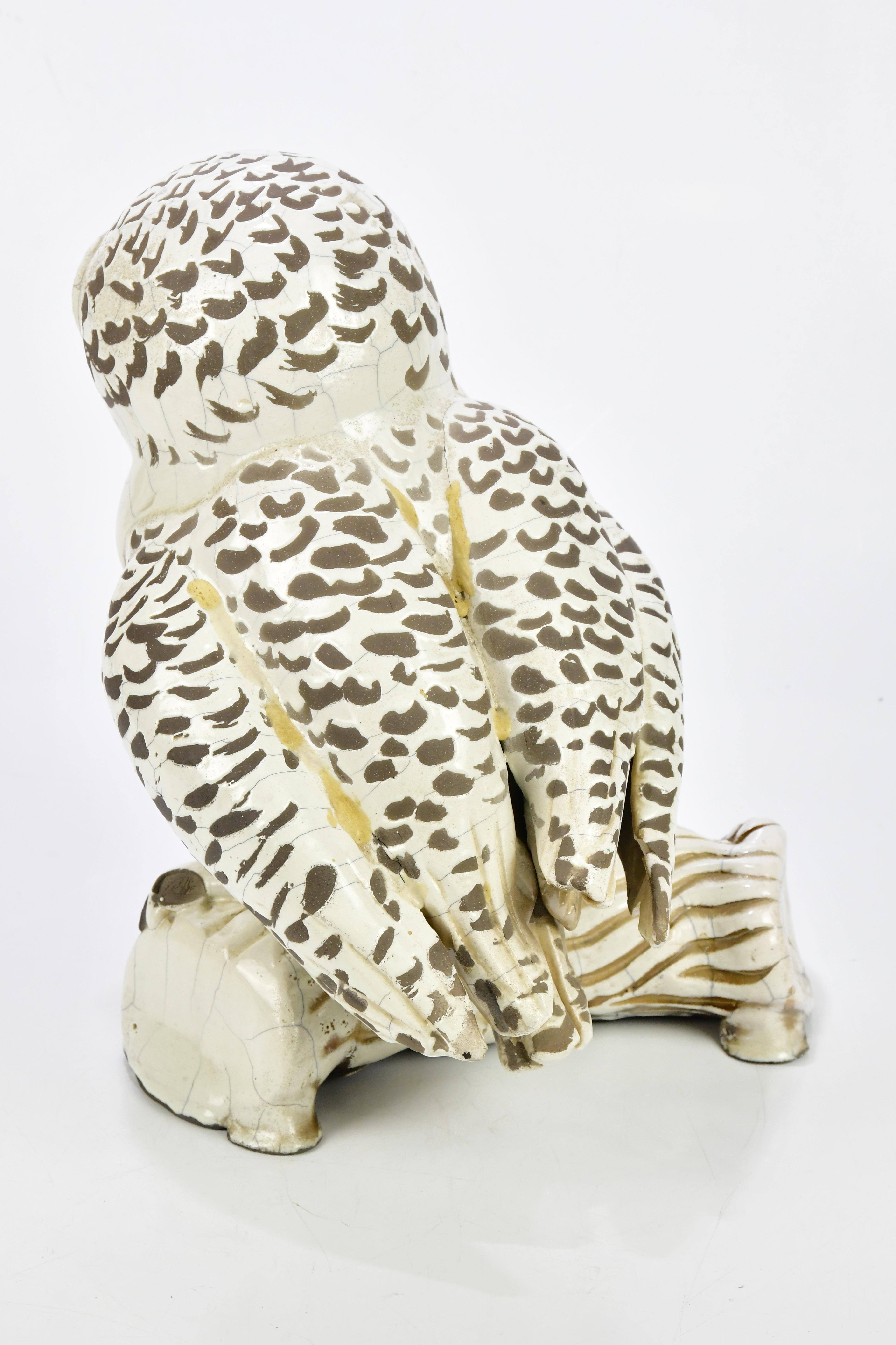 Lot 193 - A large raku model of an owl perching on a