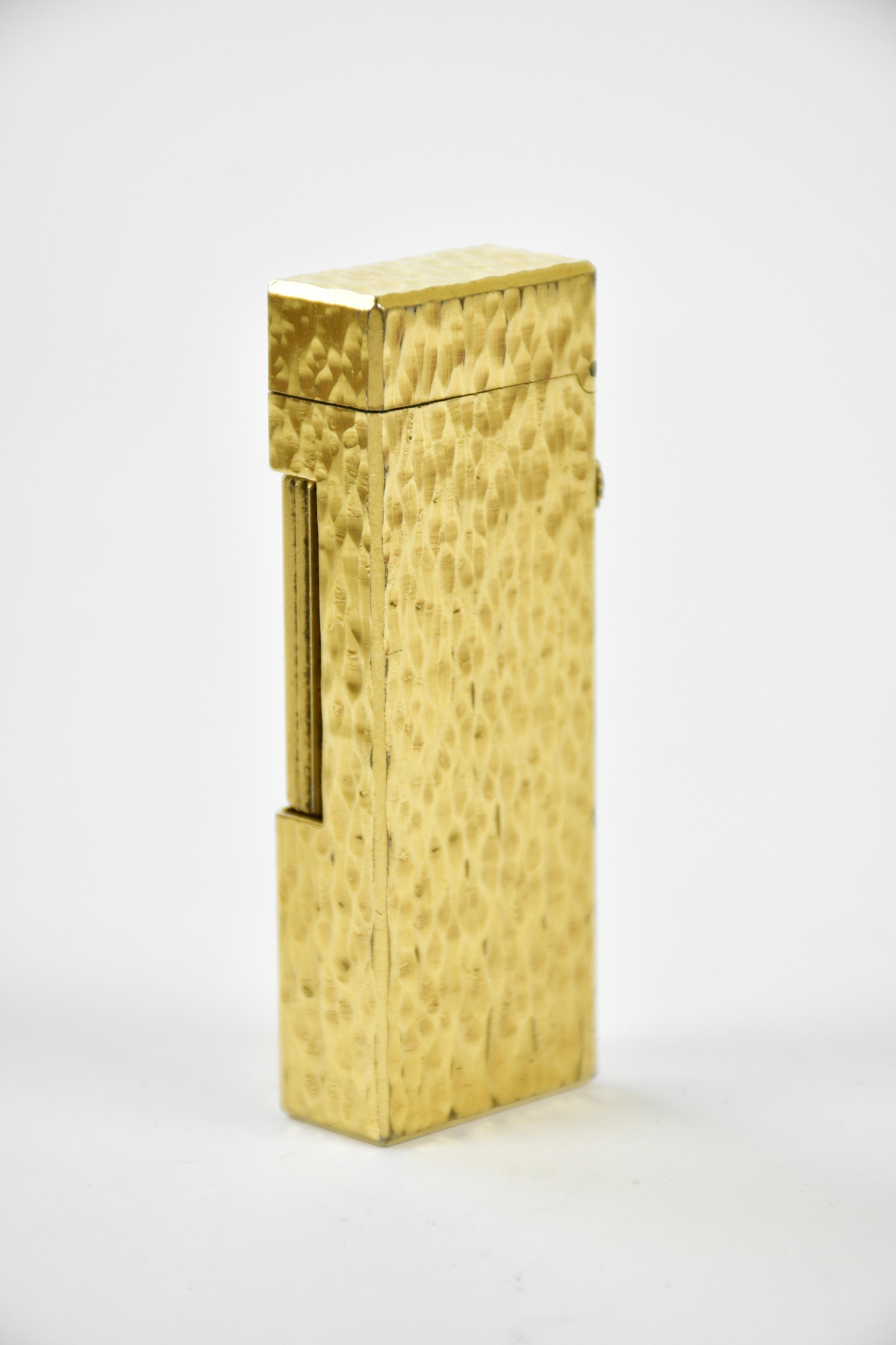 Lot 17 - DUNHILL; a gold plated textured rectangular