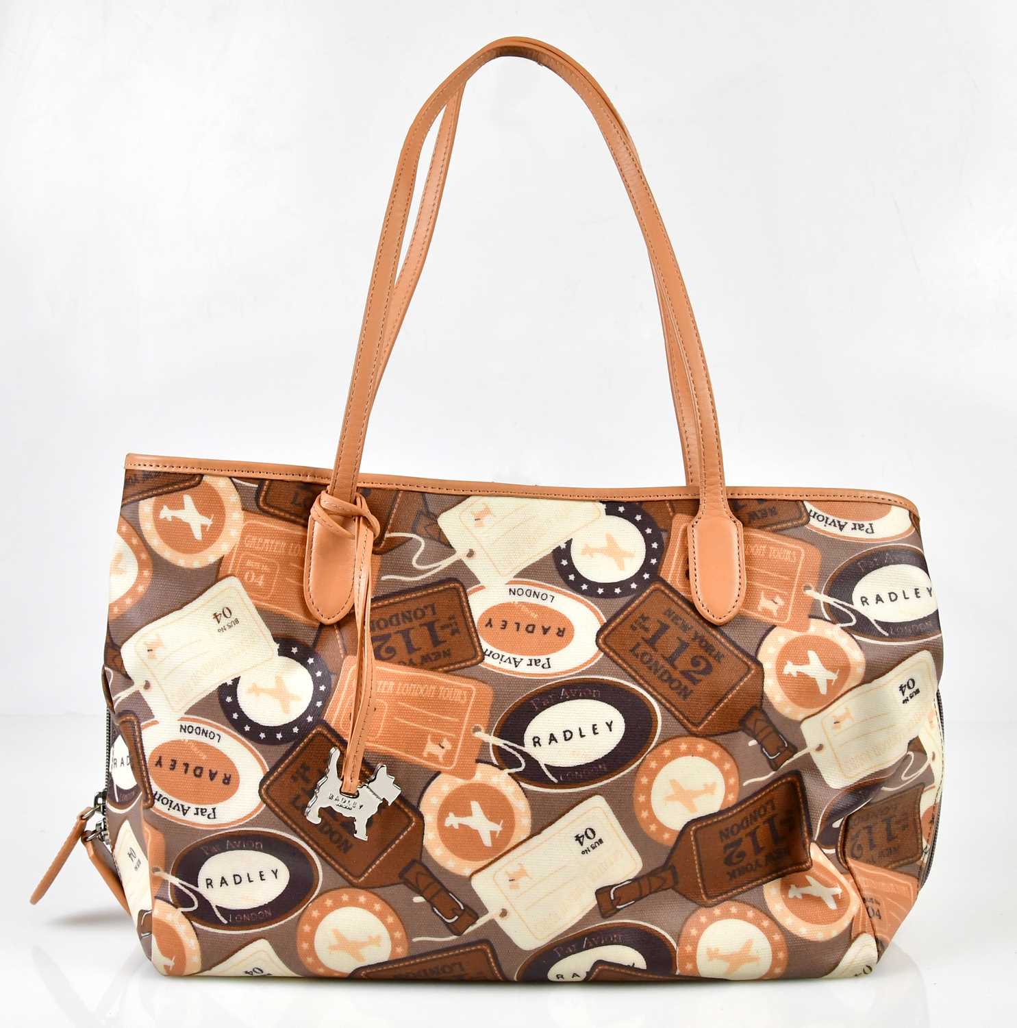 Lot 890 - RADLEY; an unused coated canvas holdall,