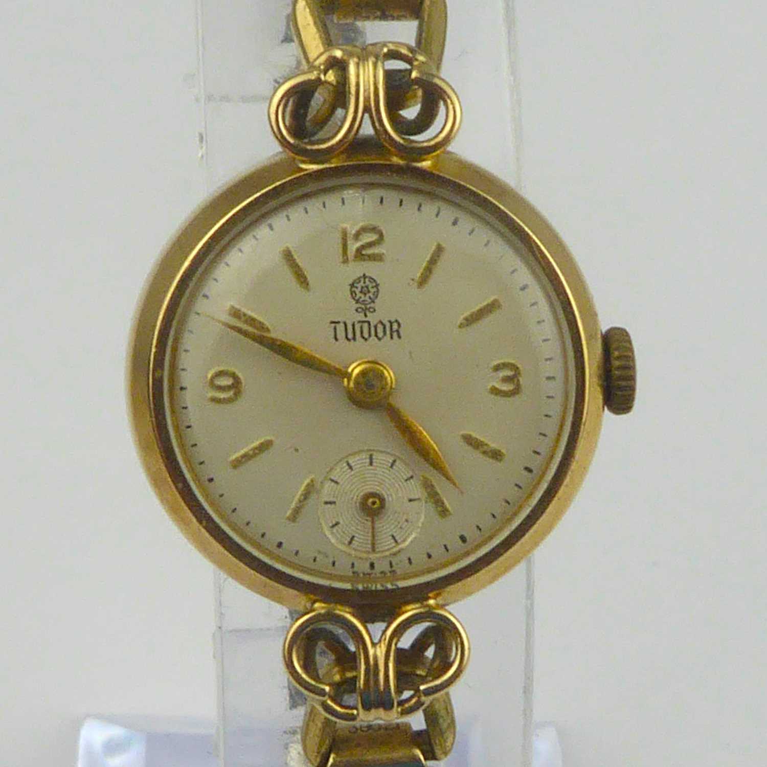 Lot 1071 - TUDOR; a ladies' 9ct gold wristwatch, the