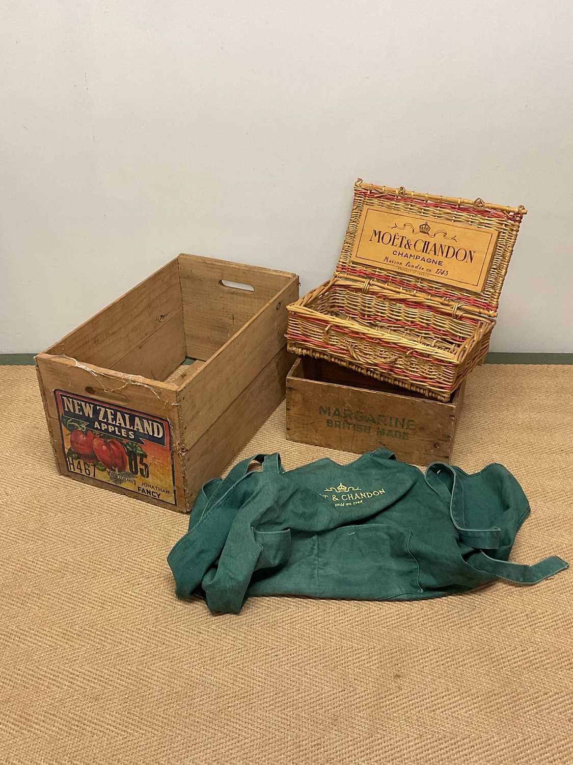 Lot 633 - Two wooden crates, a Moët & Chandon wicker