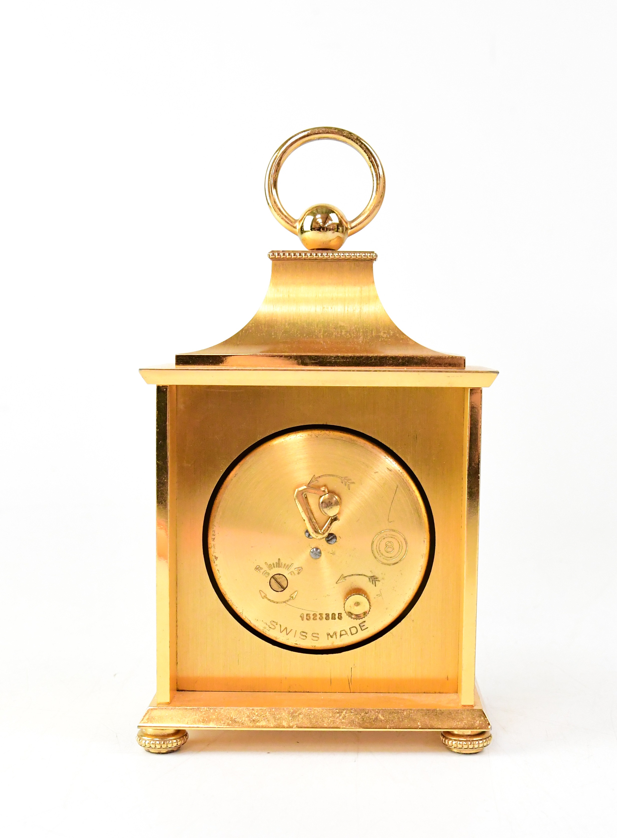 Lot 117 - BUCHERER; a brass cased carriage-type clock,