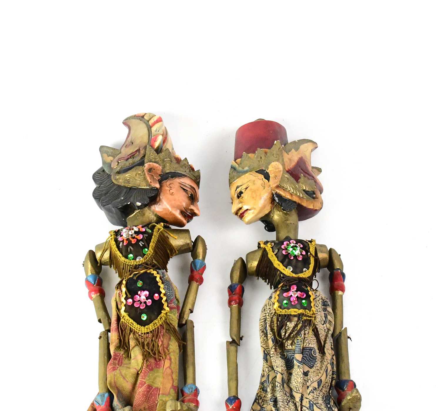 Lot 133 - A pair of Indonesian carved wooden puppets