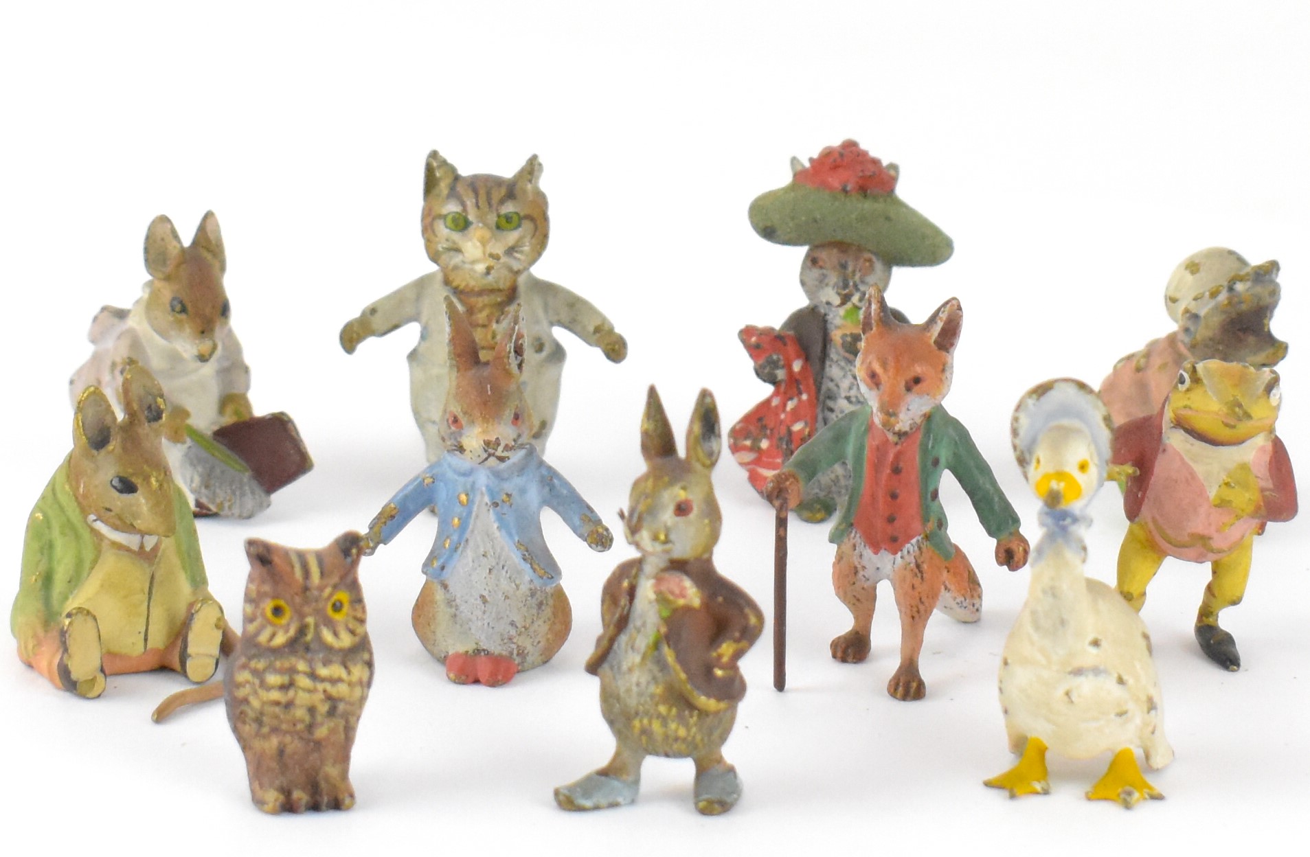 Lot 438 - BEATRIX POTTER; eleven small cold painted
