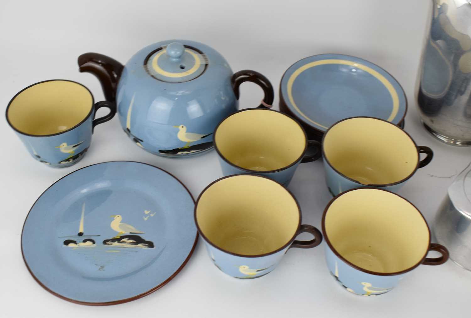 Lot 142 - PICQUOT WARE; a four-piece tea set