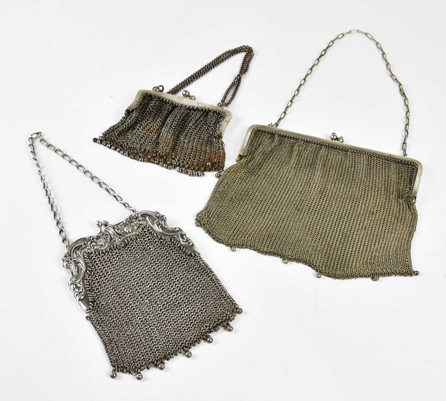 Lot 2429 - Three vintage mesh purses, one with white