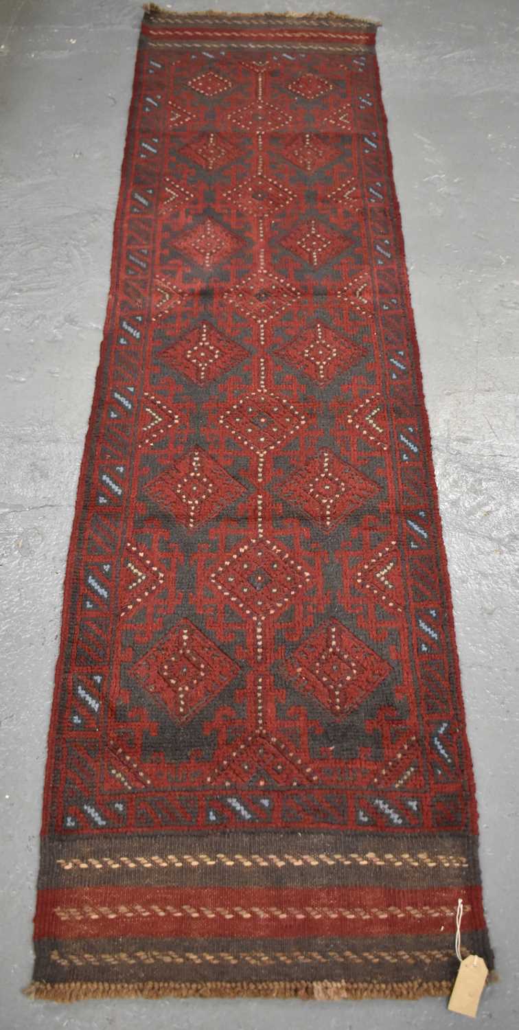 Lot 101 - A hand made woollen Meswani runner, 253 x