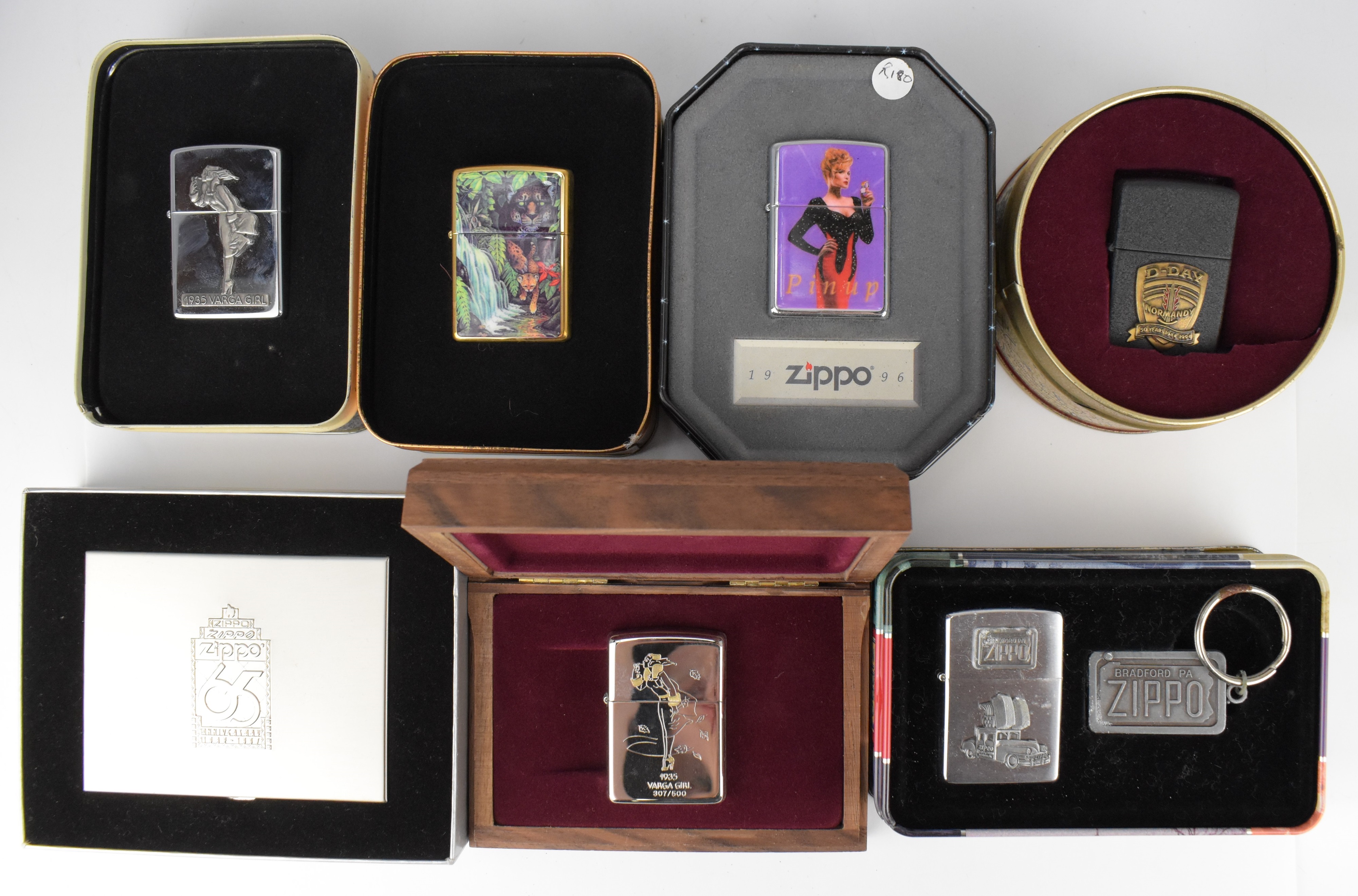 Lot 185 - ZIPPO; seven collectors' edition lighters,