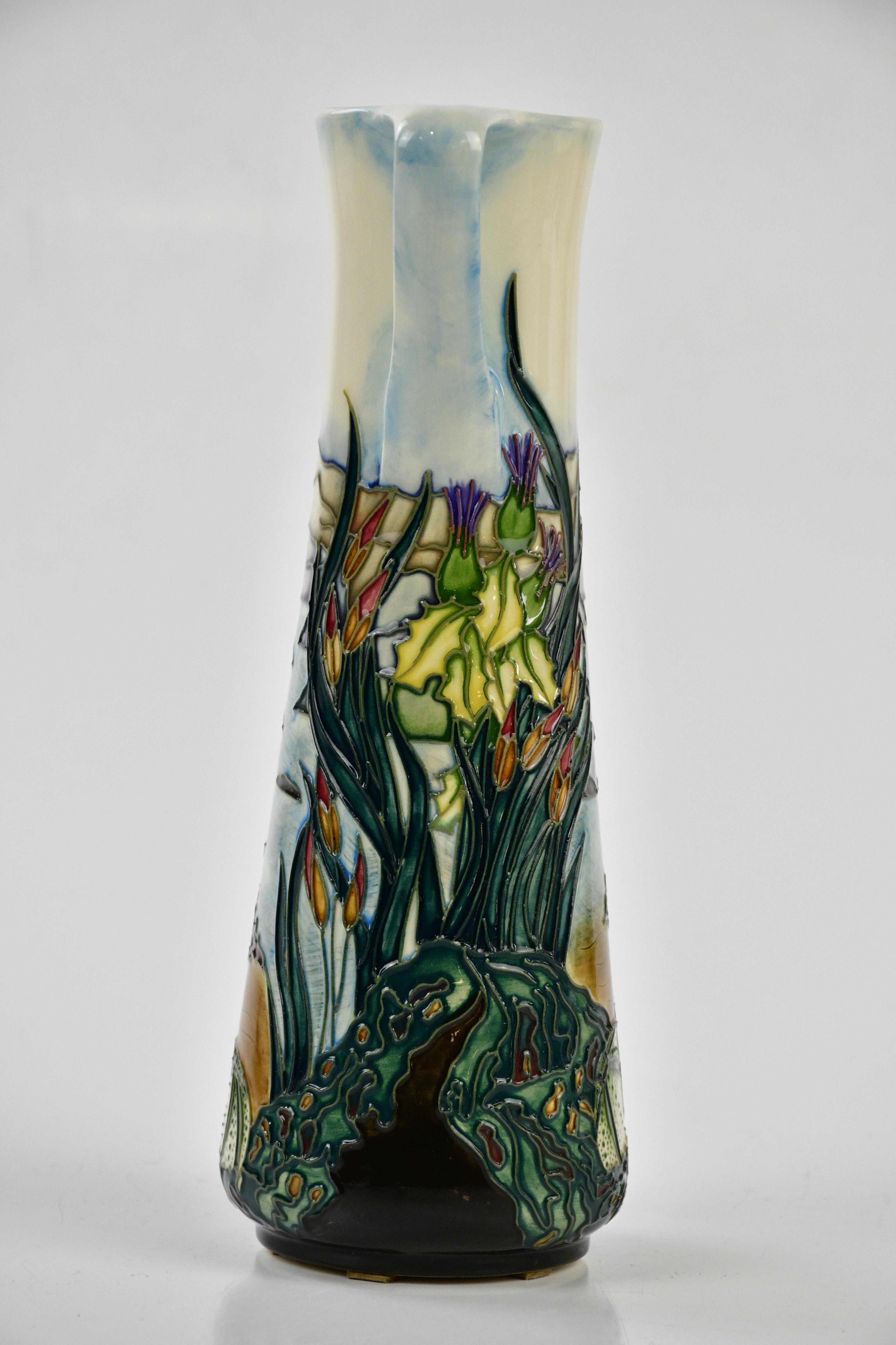 Lot 128 - MOORCROFT; a ewer decorated in the 'Islay'
