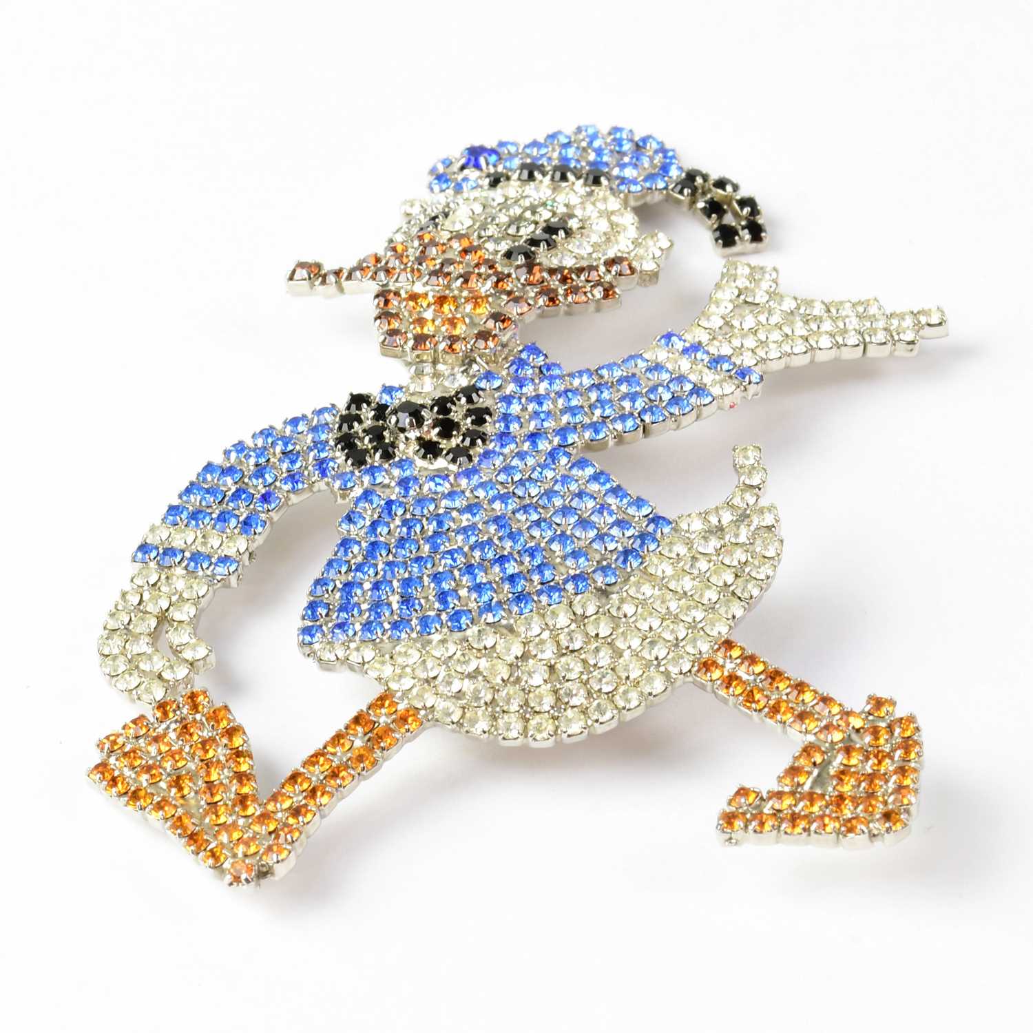 Lot 1007 - BUTLER & WILSON; a gem set brooch in the