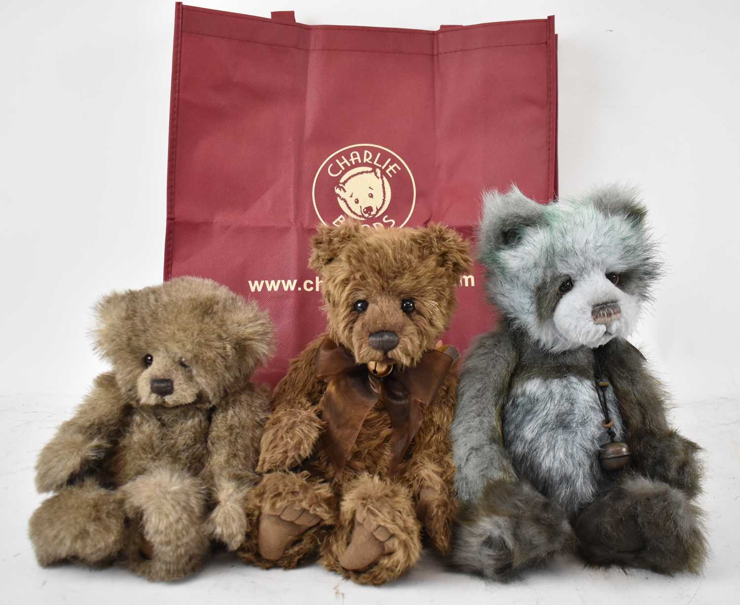 Lot 443 - CHARLIE BEARS; a green plush stuffed bear,