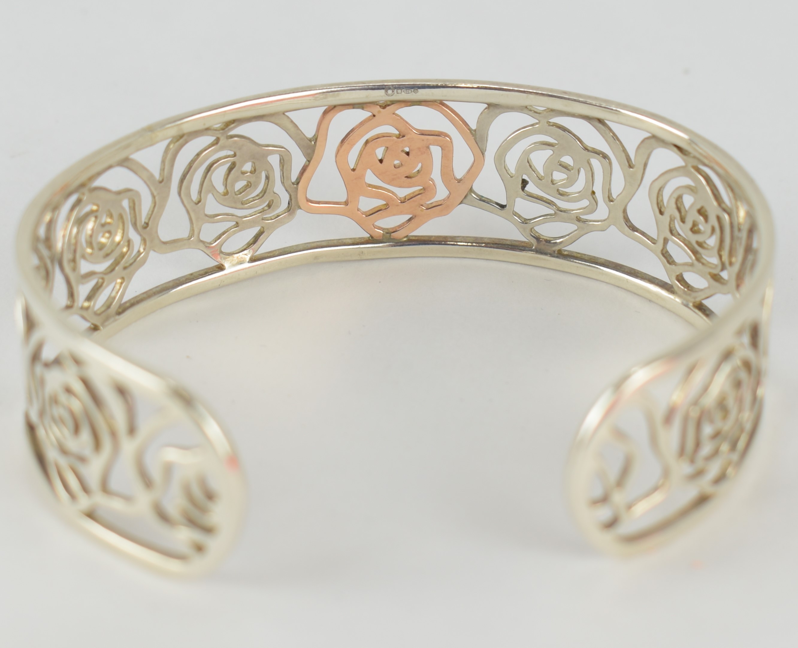 Lot 1073 - CLOGAU; a silver and rose gold 'Royal Roses'